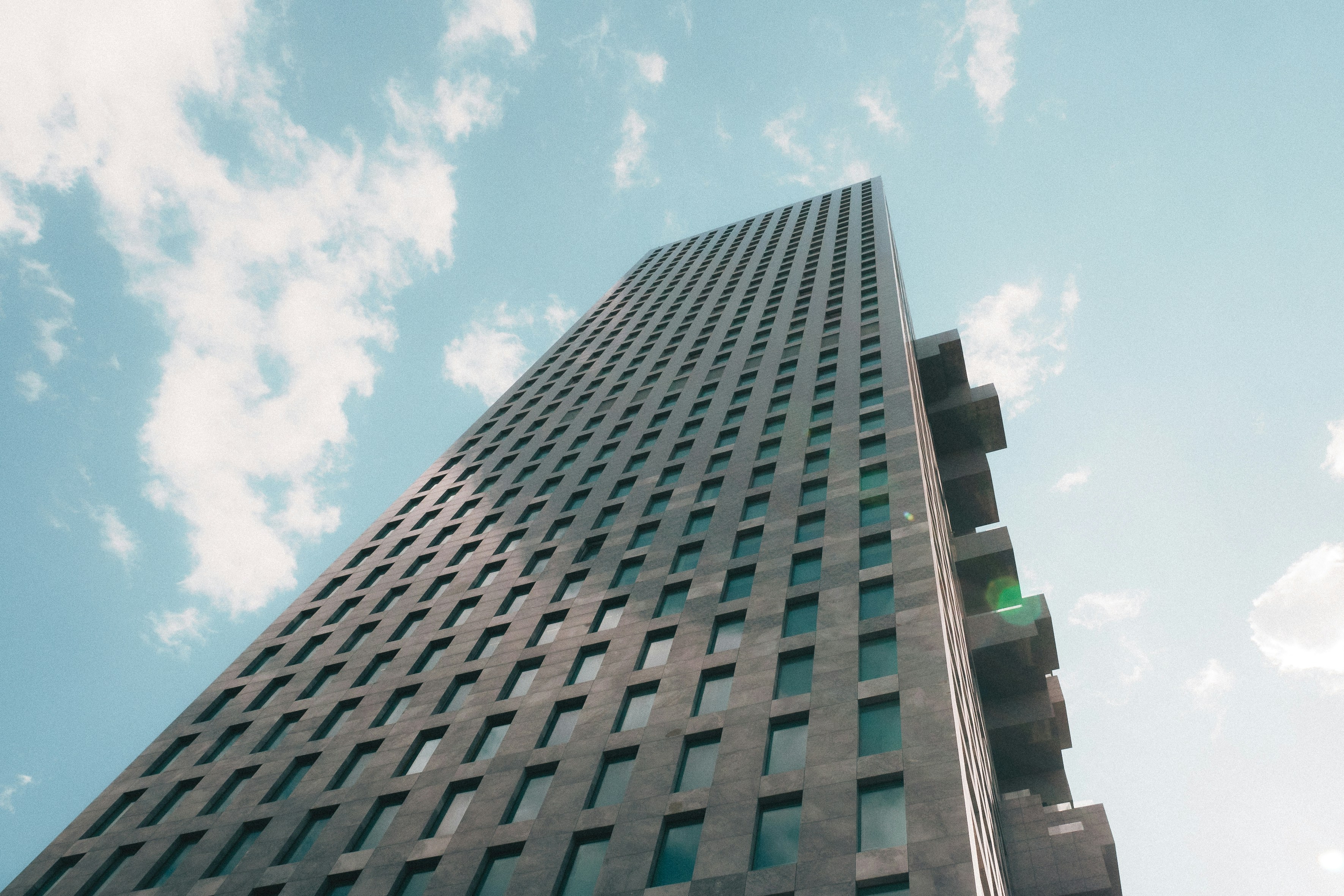 Ascend: A Skyscraper Reaching Toward a Bright Sky