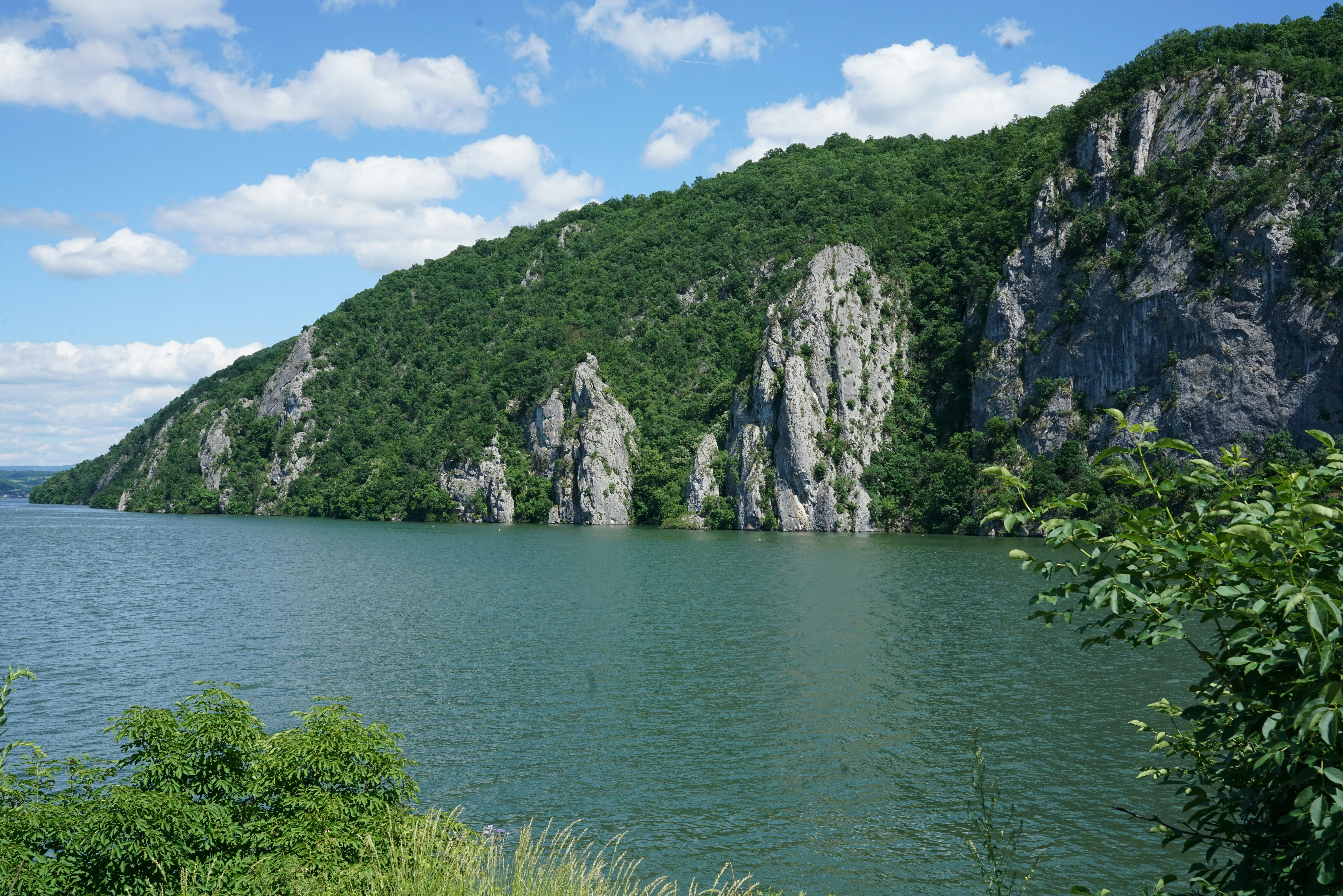 Limestone Cliffs Embrace a Quiet Lake