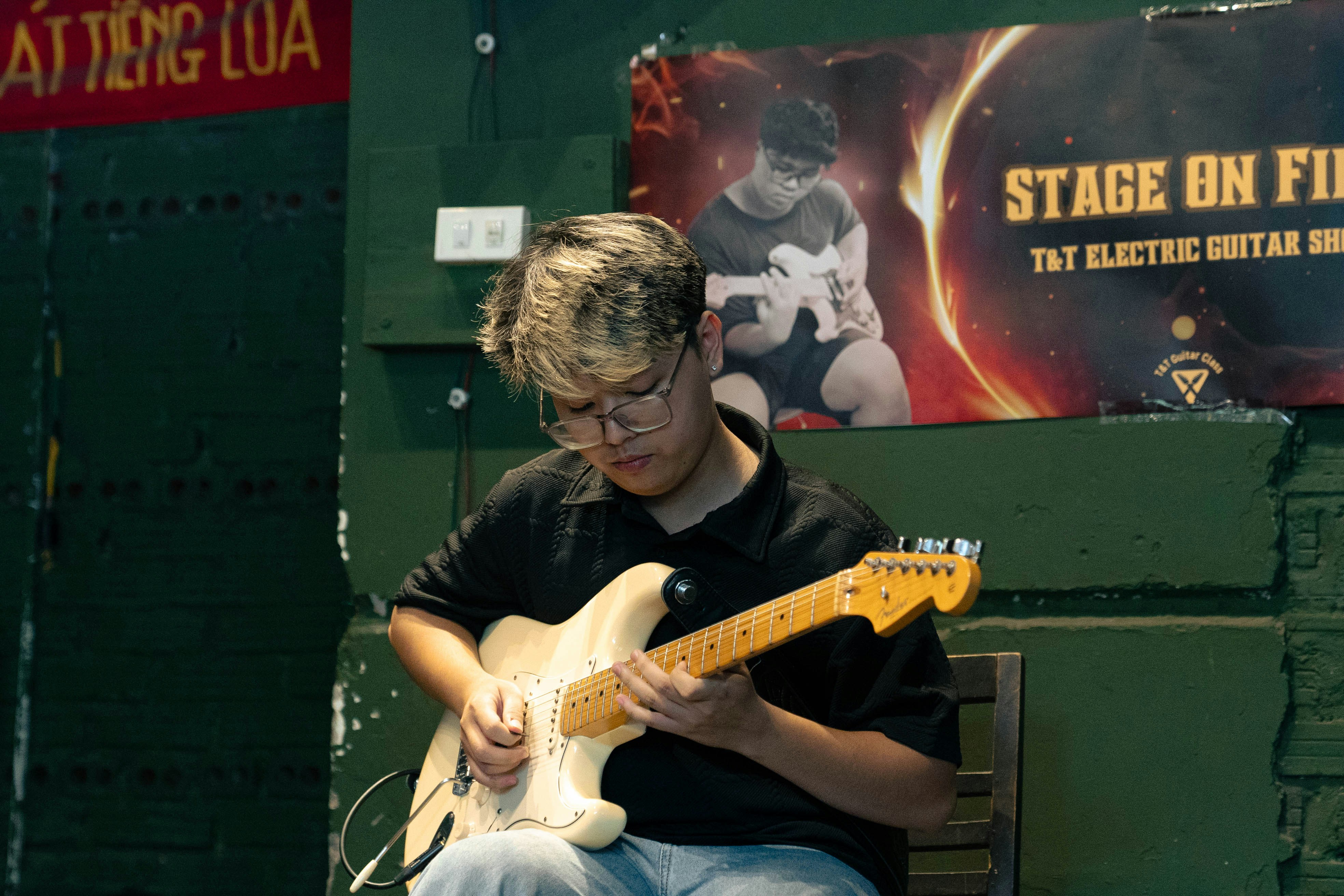 Guitar in Focus: A Quiet Moment on Stage Backdrop