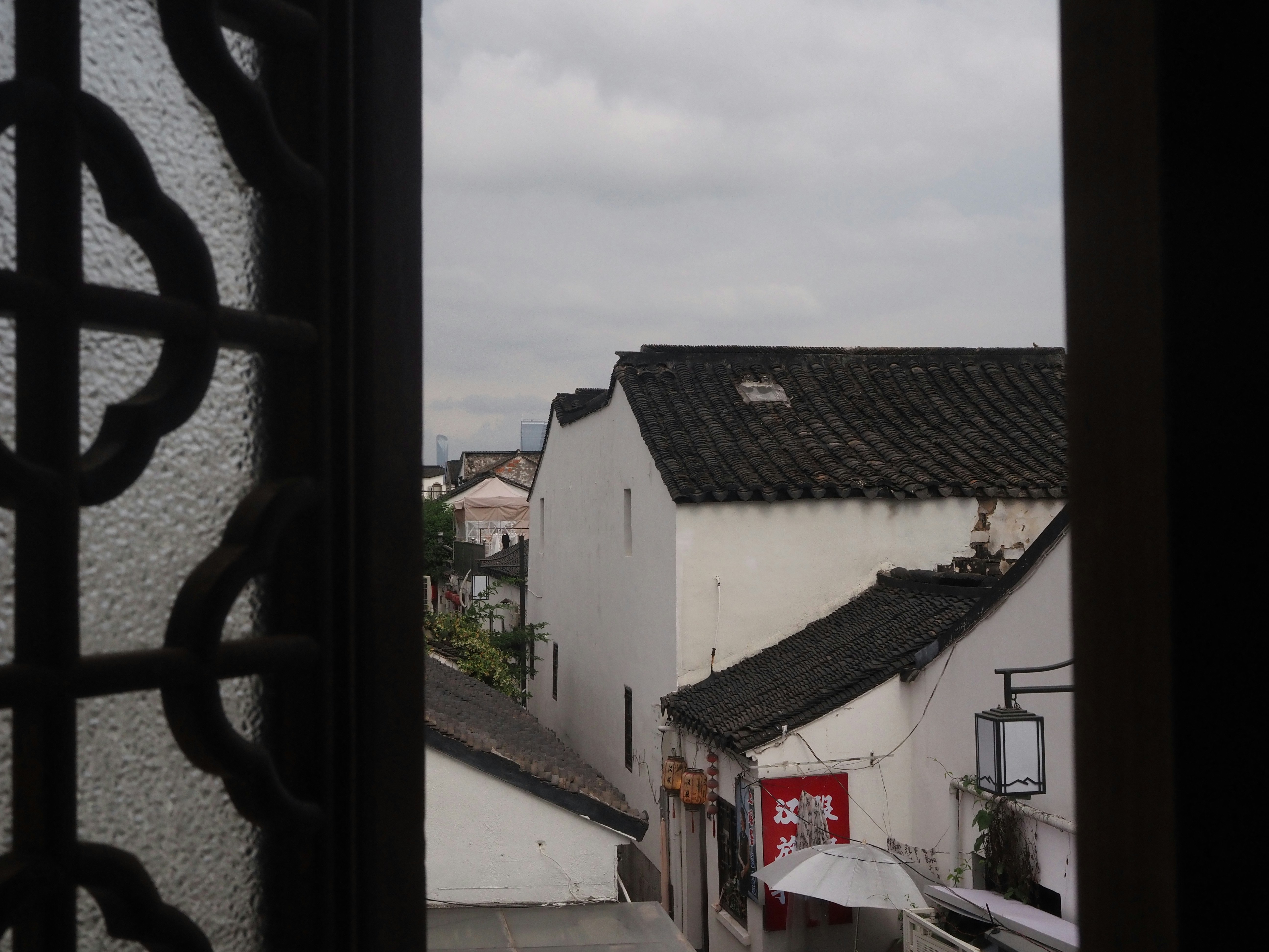 Quiet Alleyway of Whitewashed Tiles and Tiled Roofs