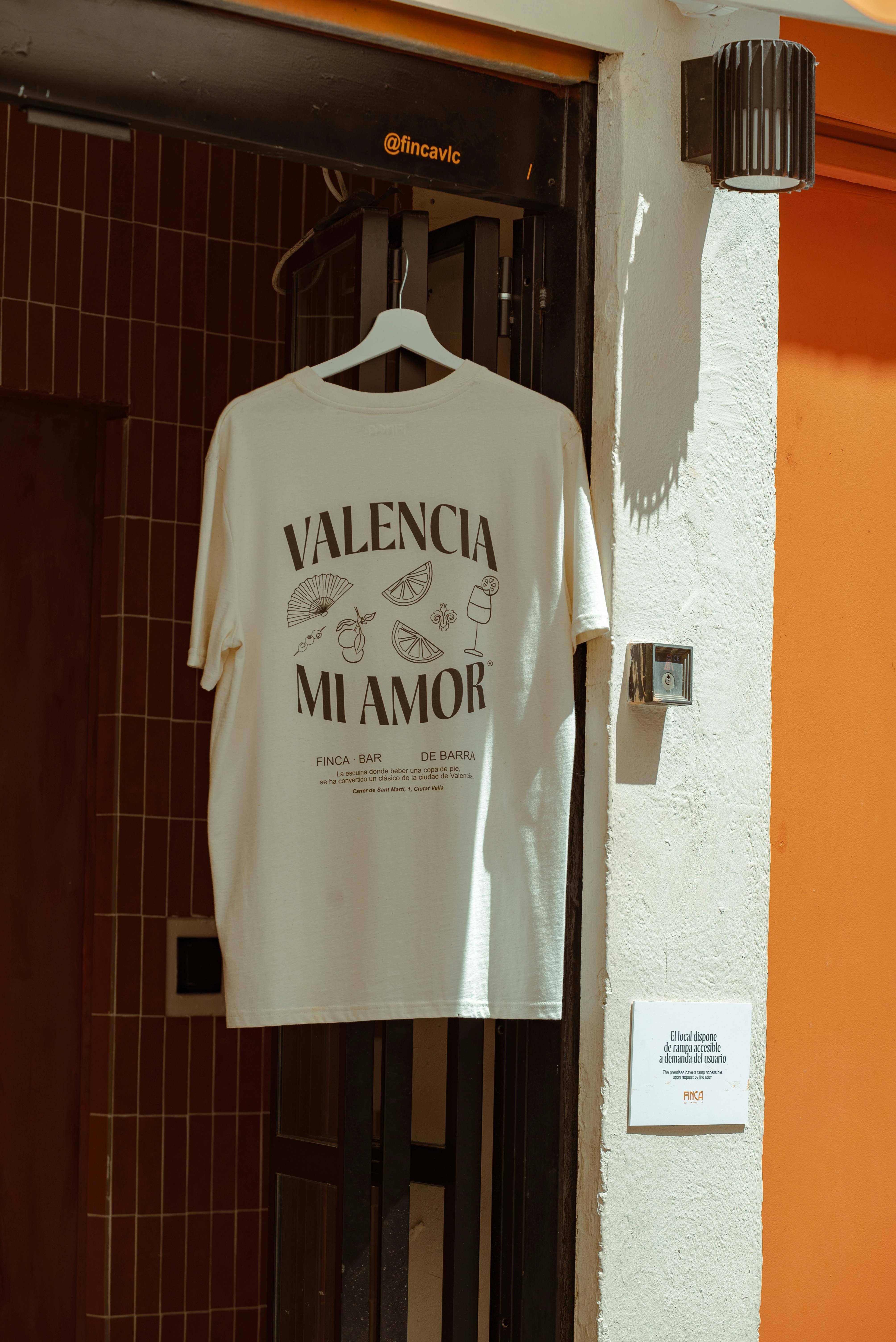 Valencia Vibe: Tee on Display at the Sunlit Doorway