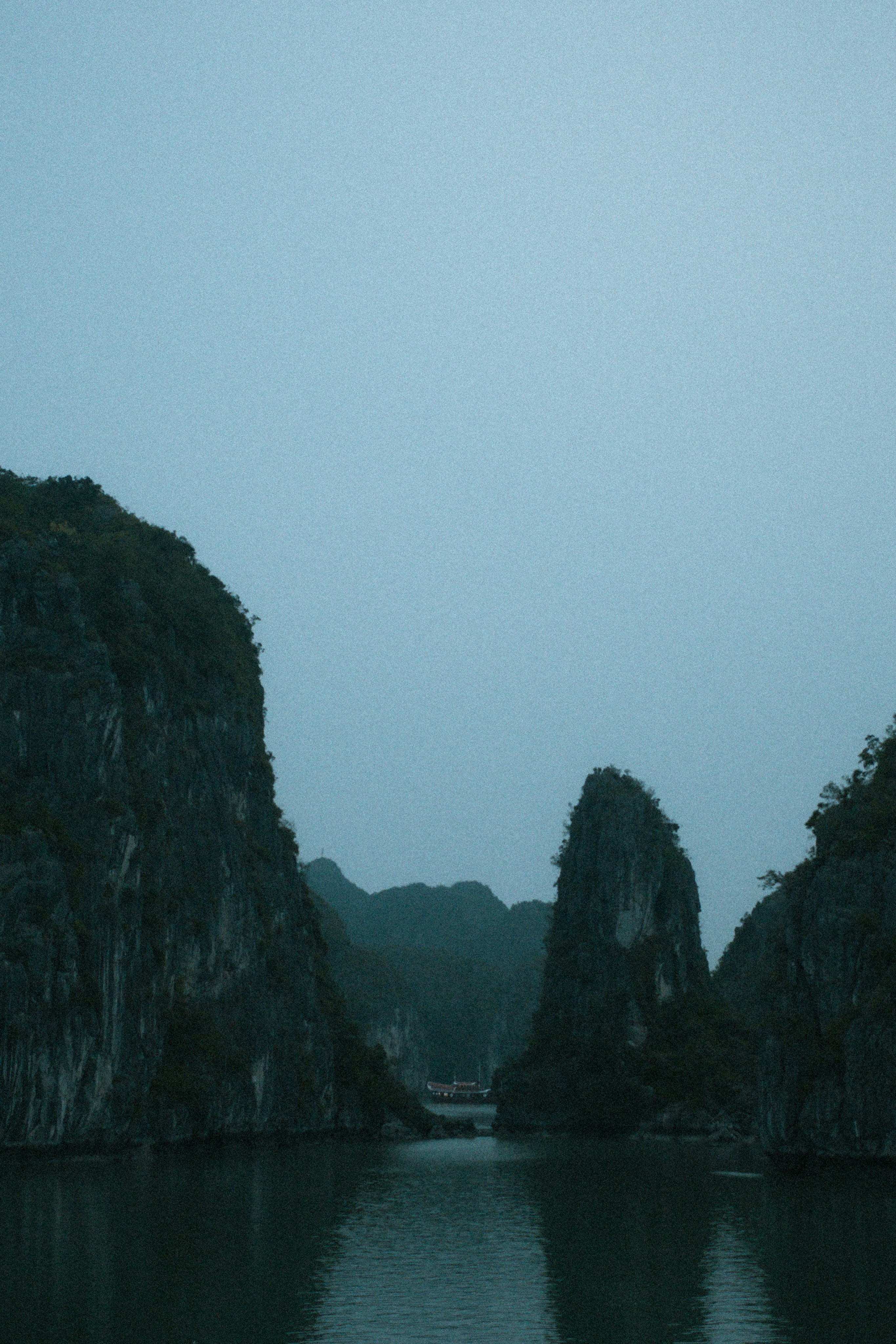 Misty Karst Gorge Center: A Narrow Channel Between Towering Cliffs