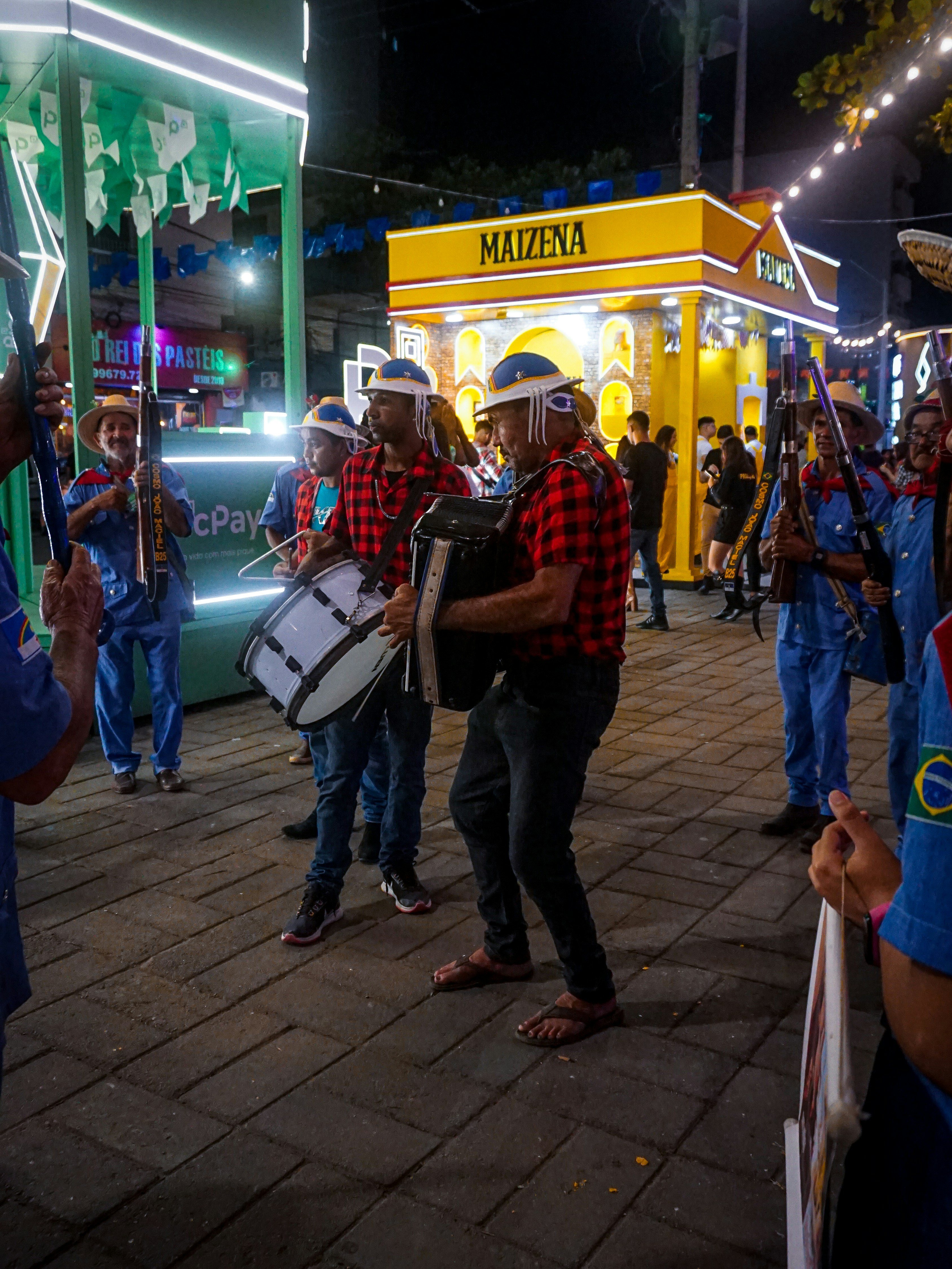 Night Parade Percussion: Drums Meet Neon Under Festival Flags