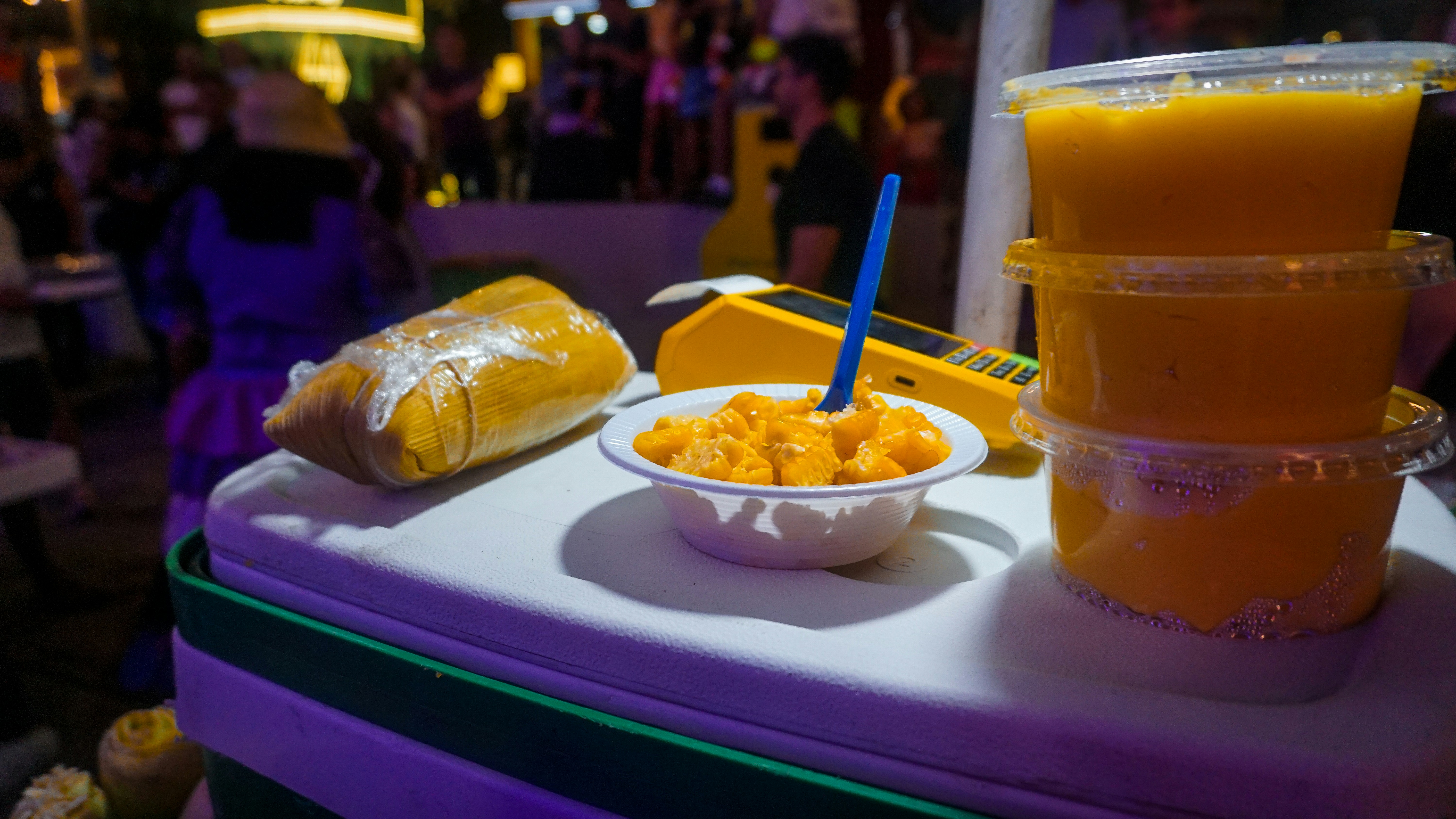 Midnight Snack Stall: Mango Custards and Chips under Neon Glow