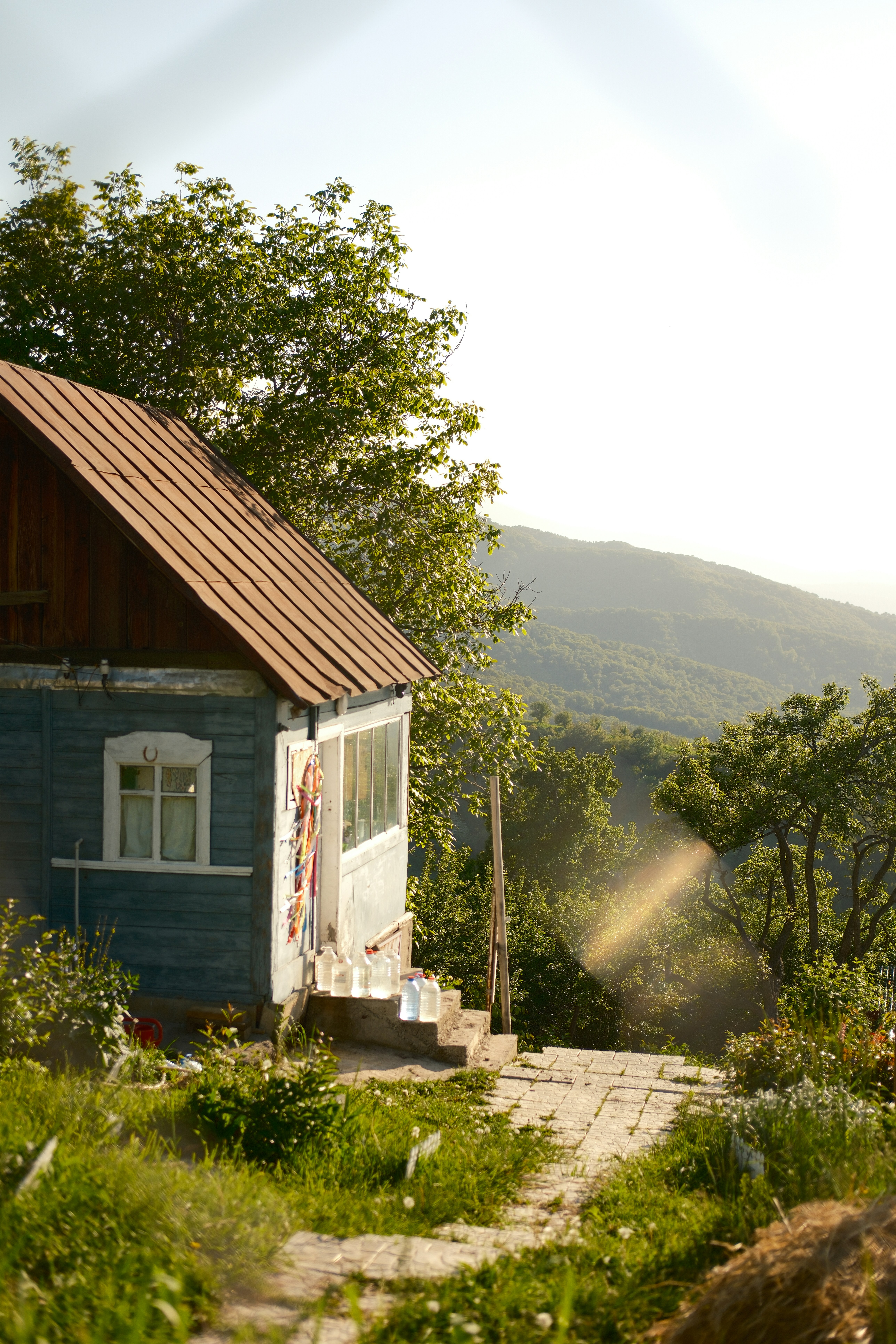 Sunlit Cottage on a Sloped Pathway
