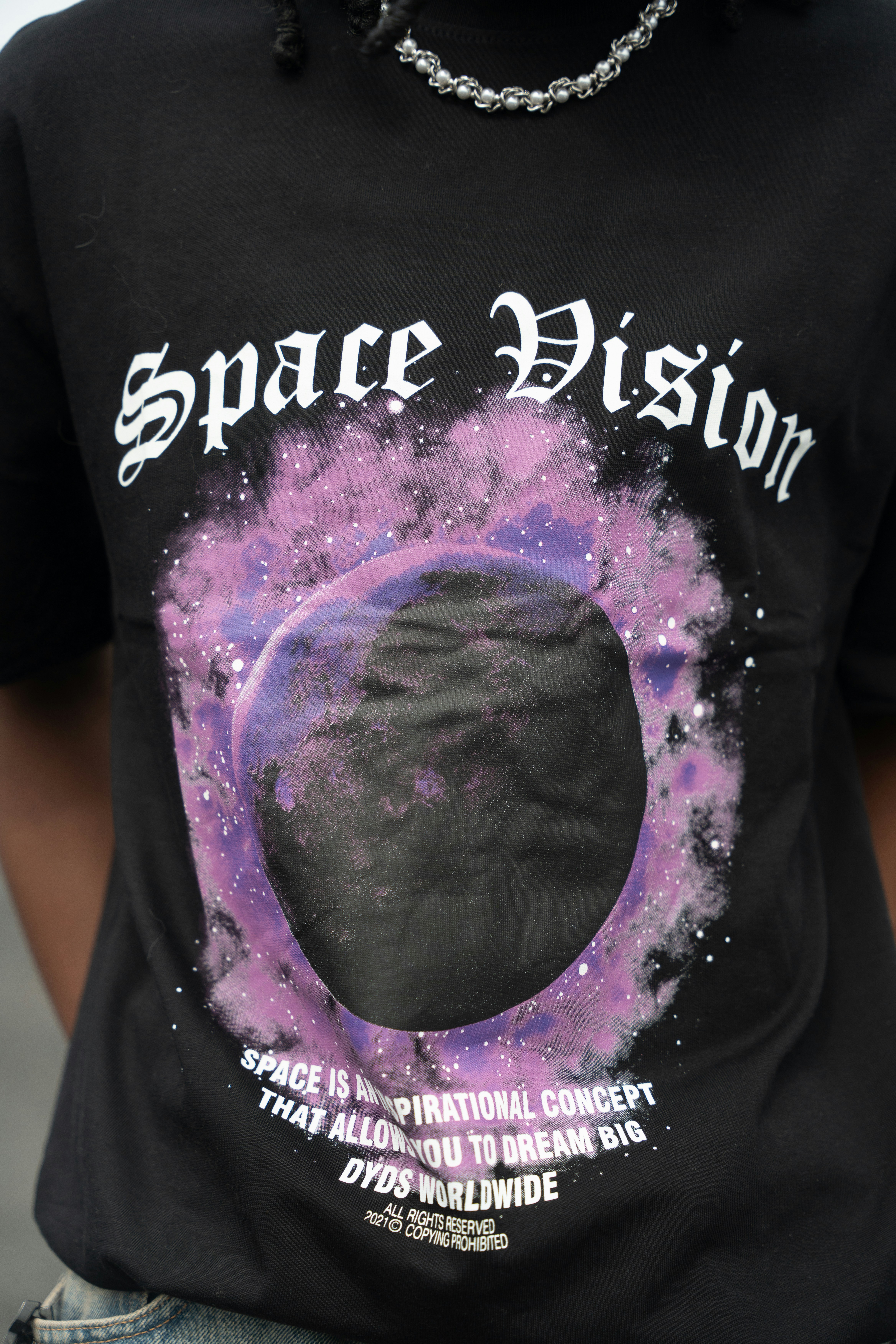 Cosmic Messenger: Space Vision Tee Framing the Galaxy