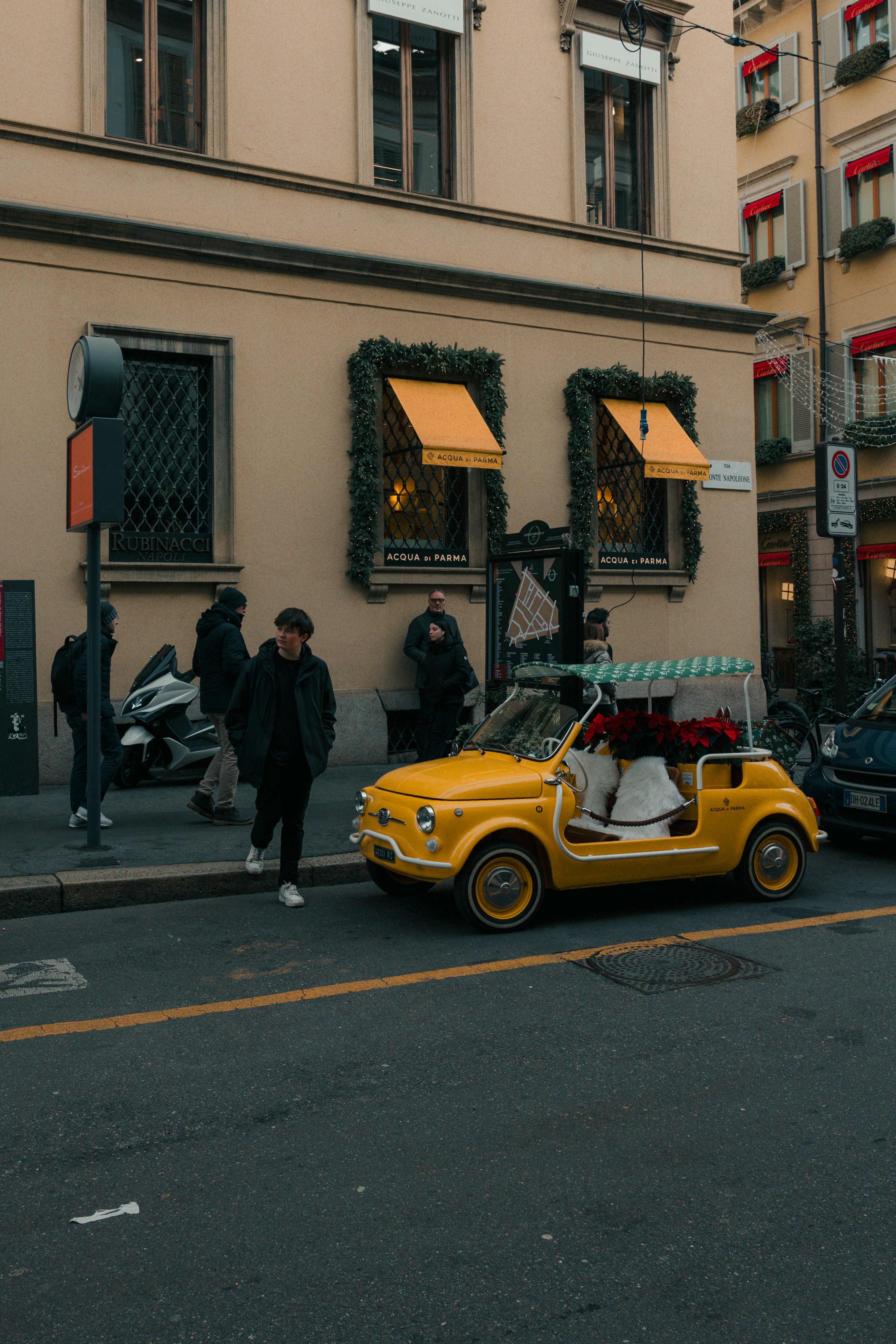 Sunny Convertible on a European Street amid Fashionable Storefronts