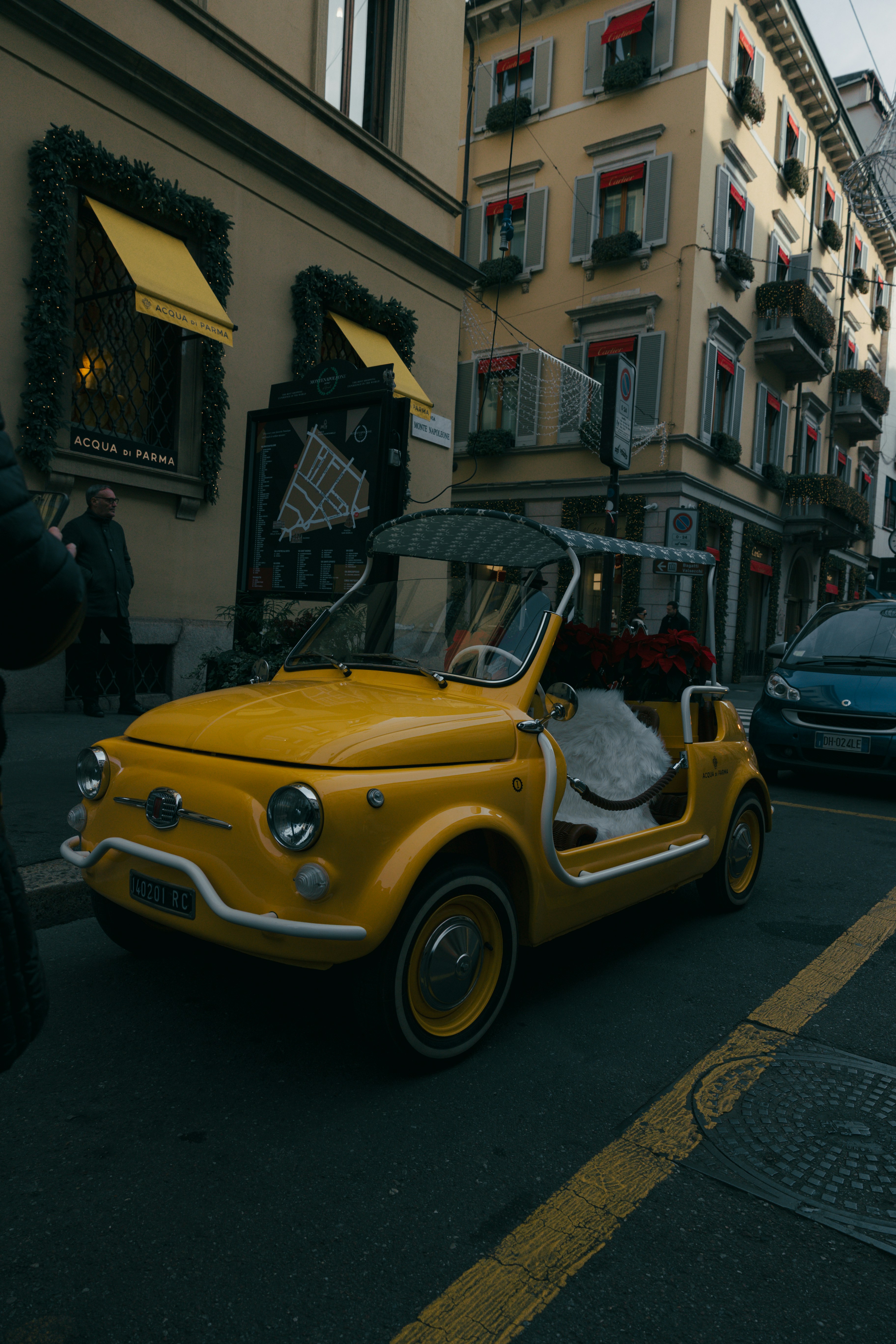 Sunlit Yellow Convertible Quietly Claims a City Street