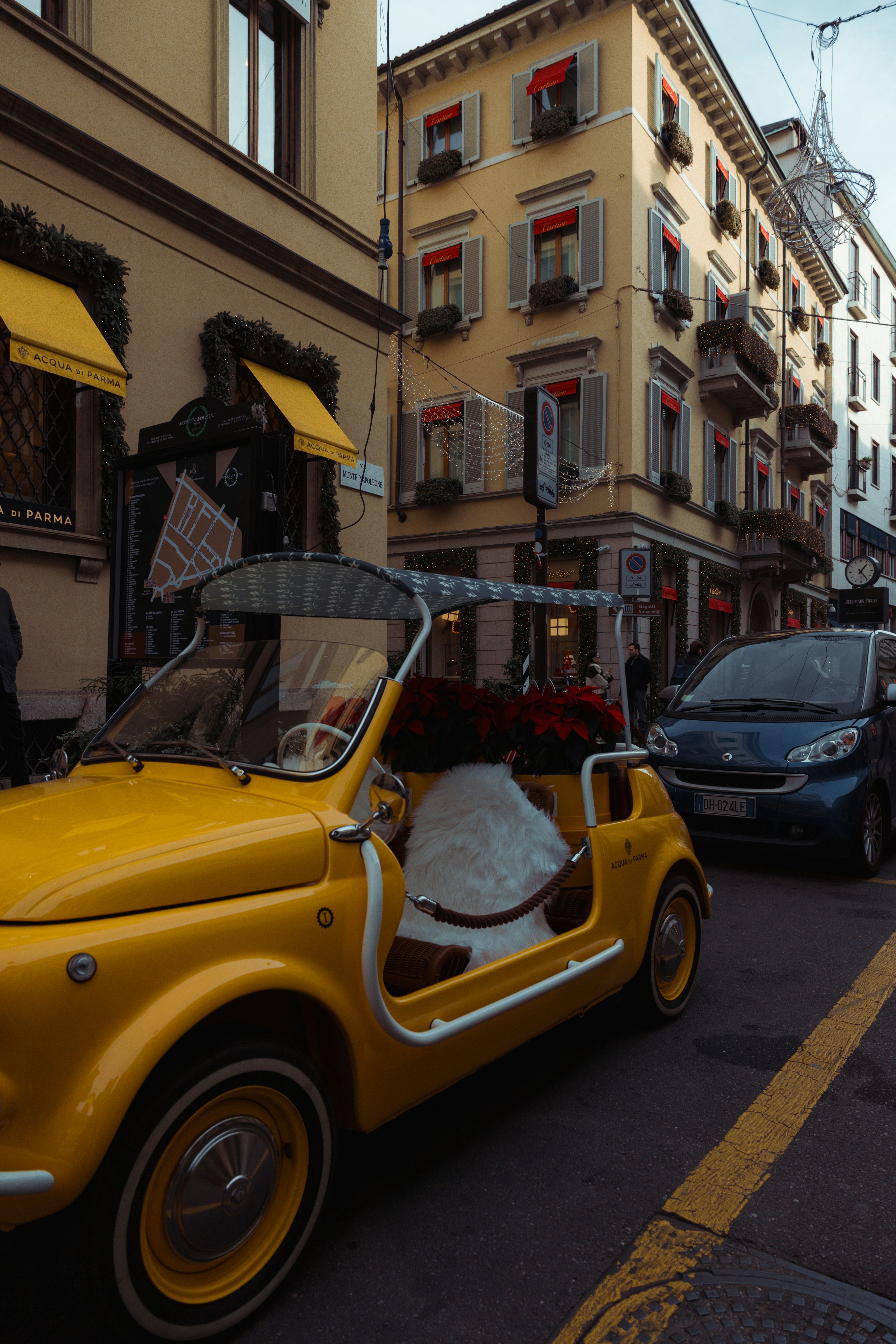 Yellow Convertible in a European Street Scene