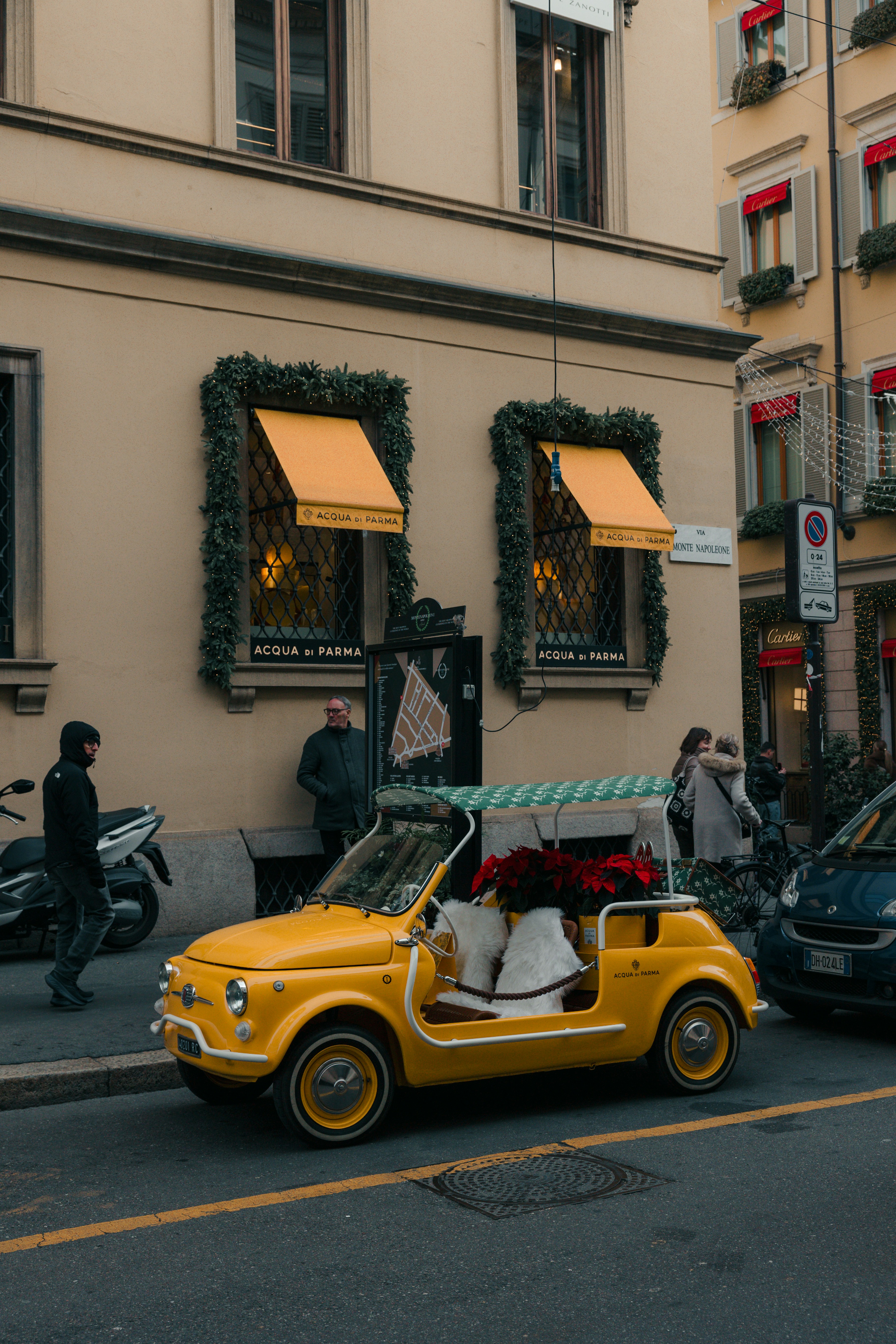 Yellow Vintage Convertible on a European Street with Clover-Wrapped Windows