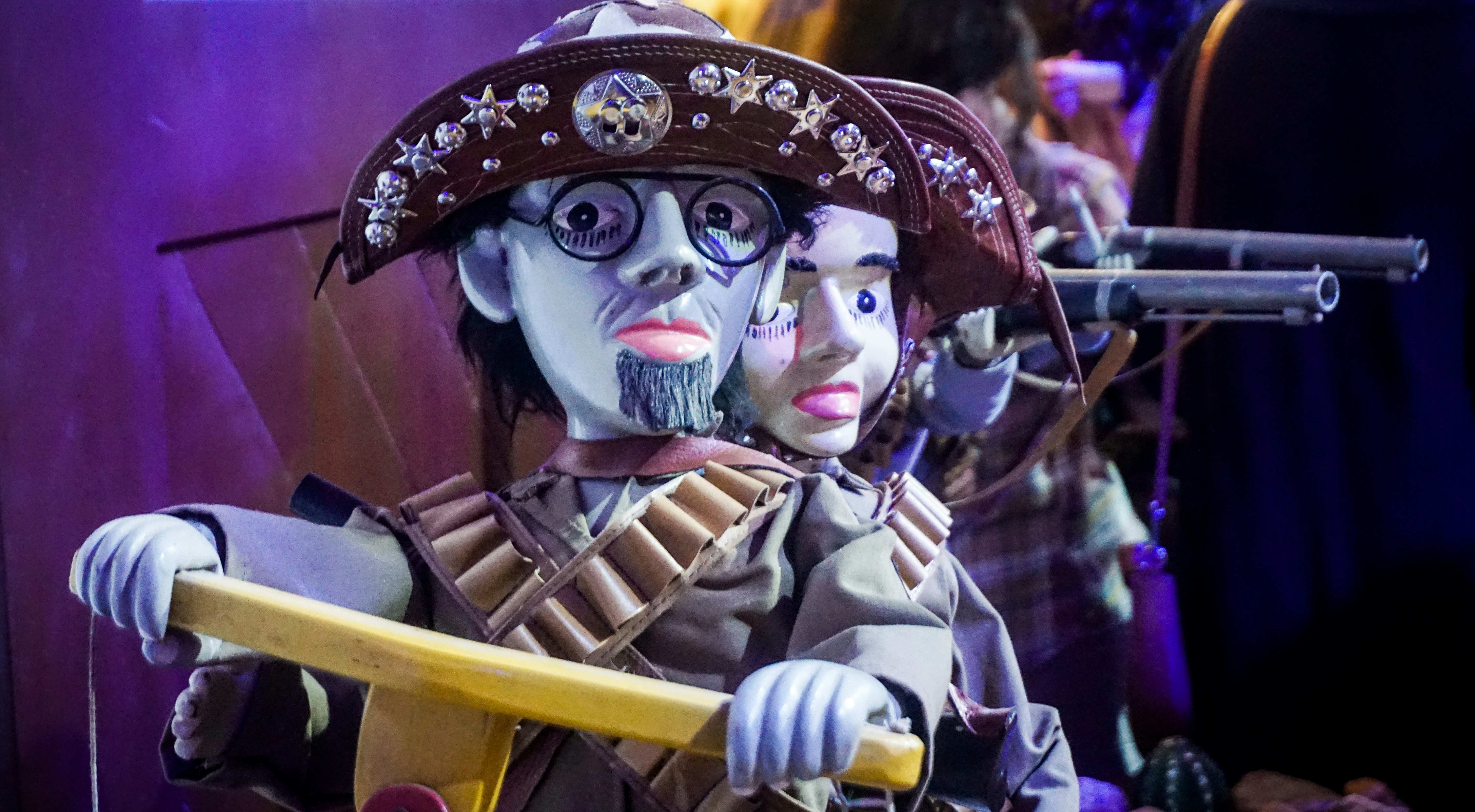 Masked Duel: Puppet Warriors in a Neon Parade