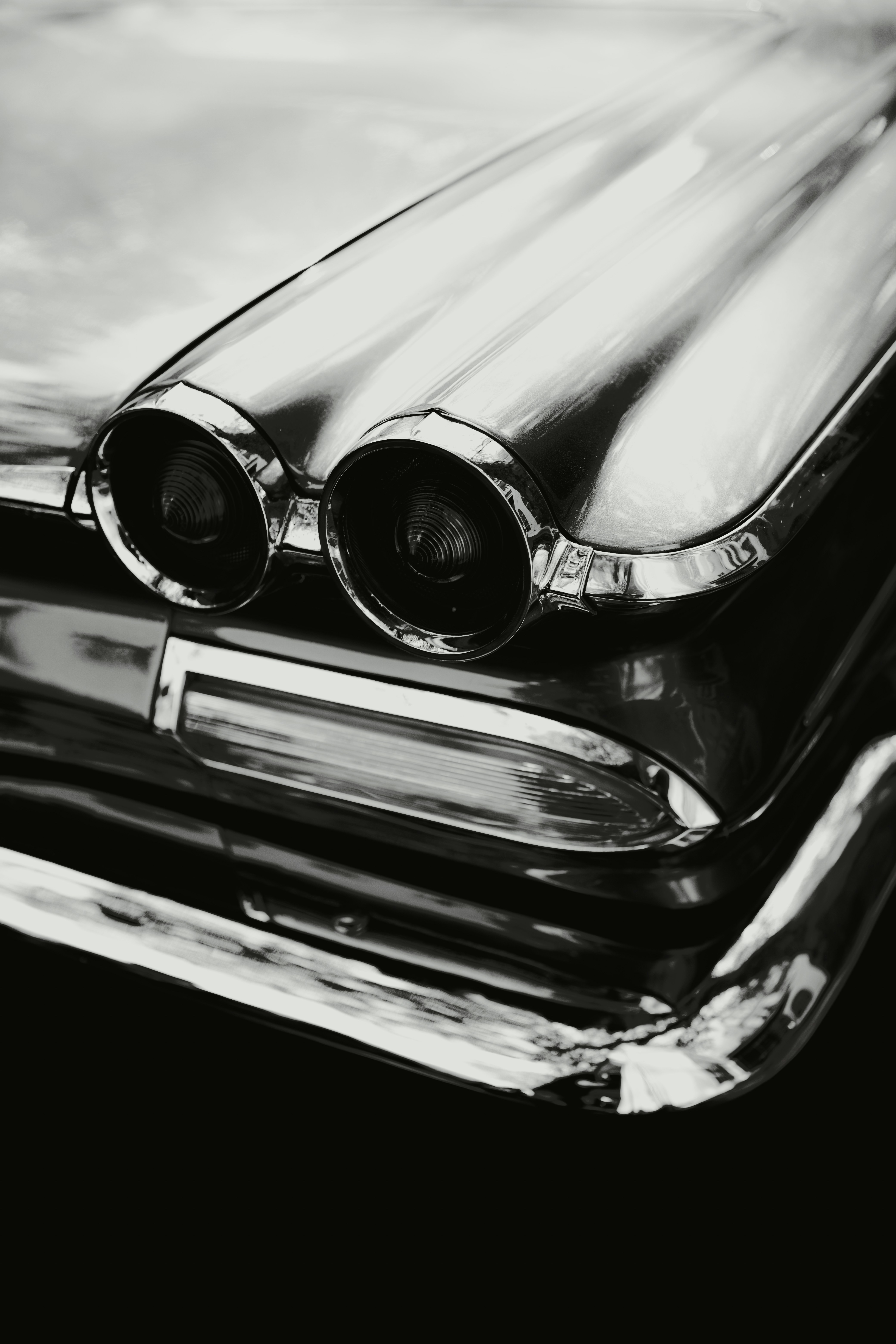 Chrome Echo: The Dual Rear Lights of a Classic Car