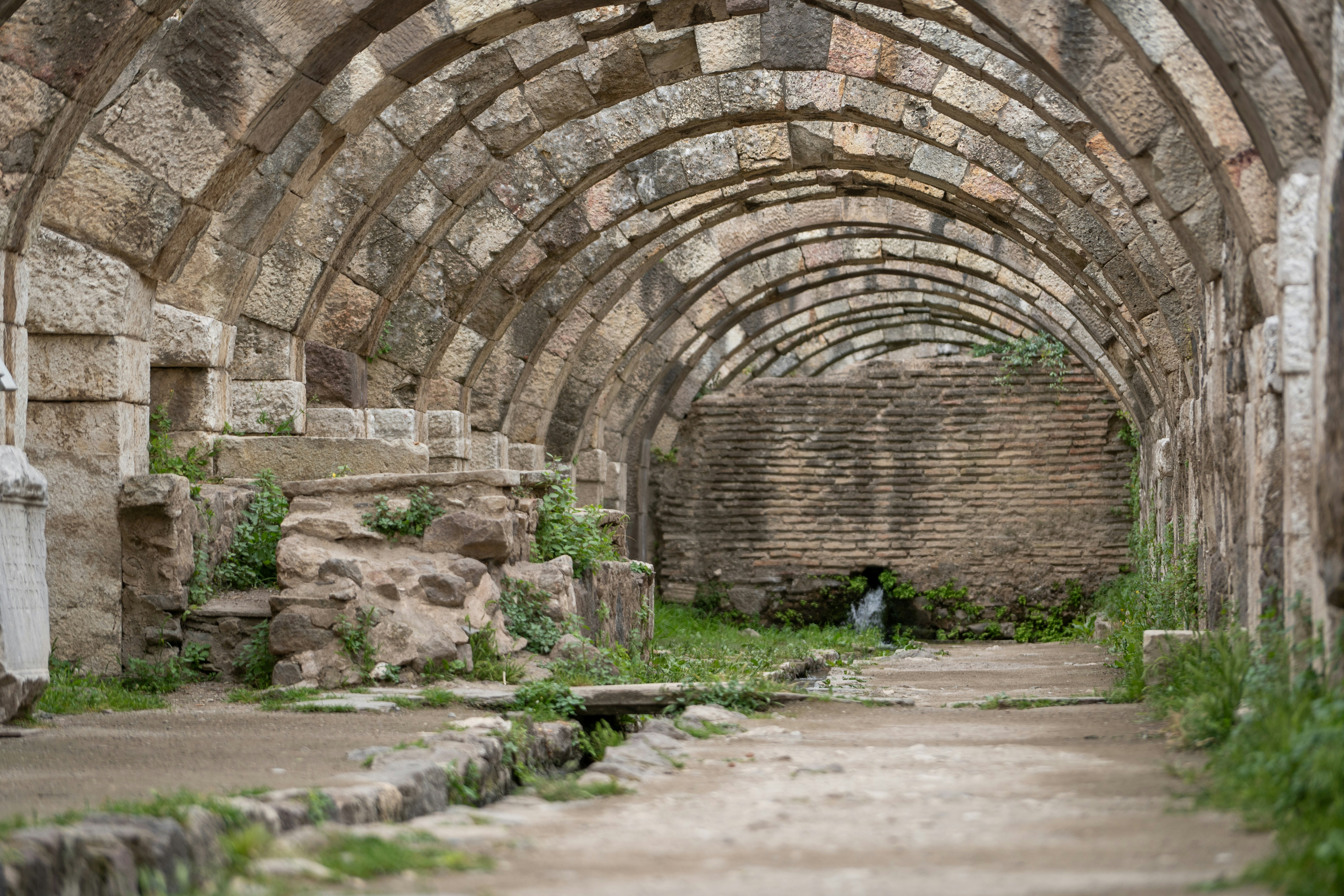 Echoes of Stone: Receding Arches in a Quiet Ruin