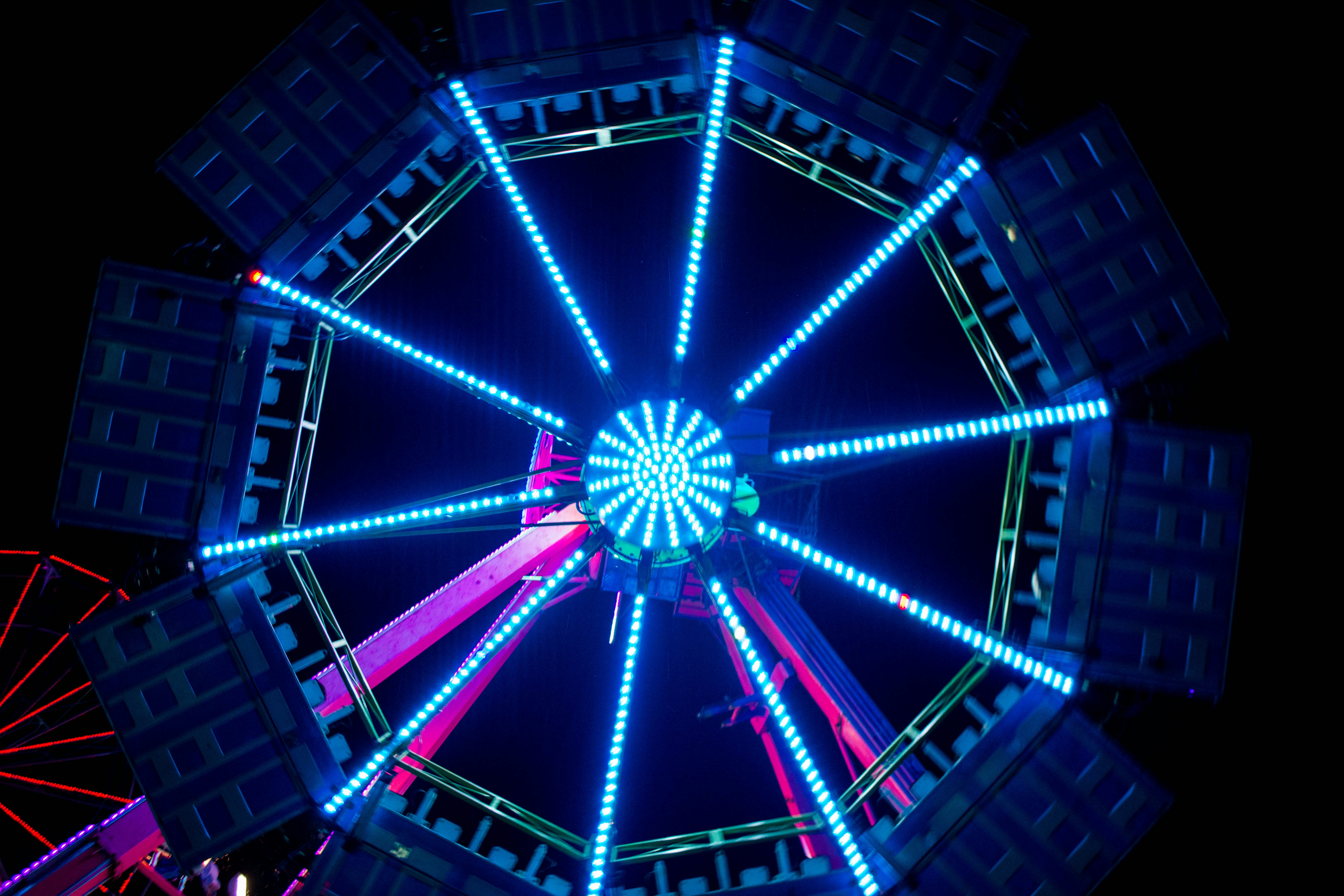 Neon Crown: A Ferris Wheel Fireworks of Light