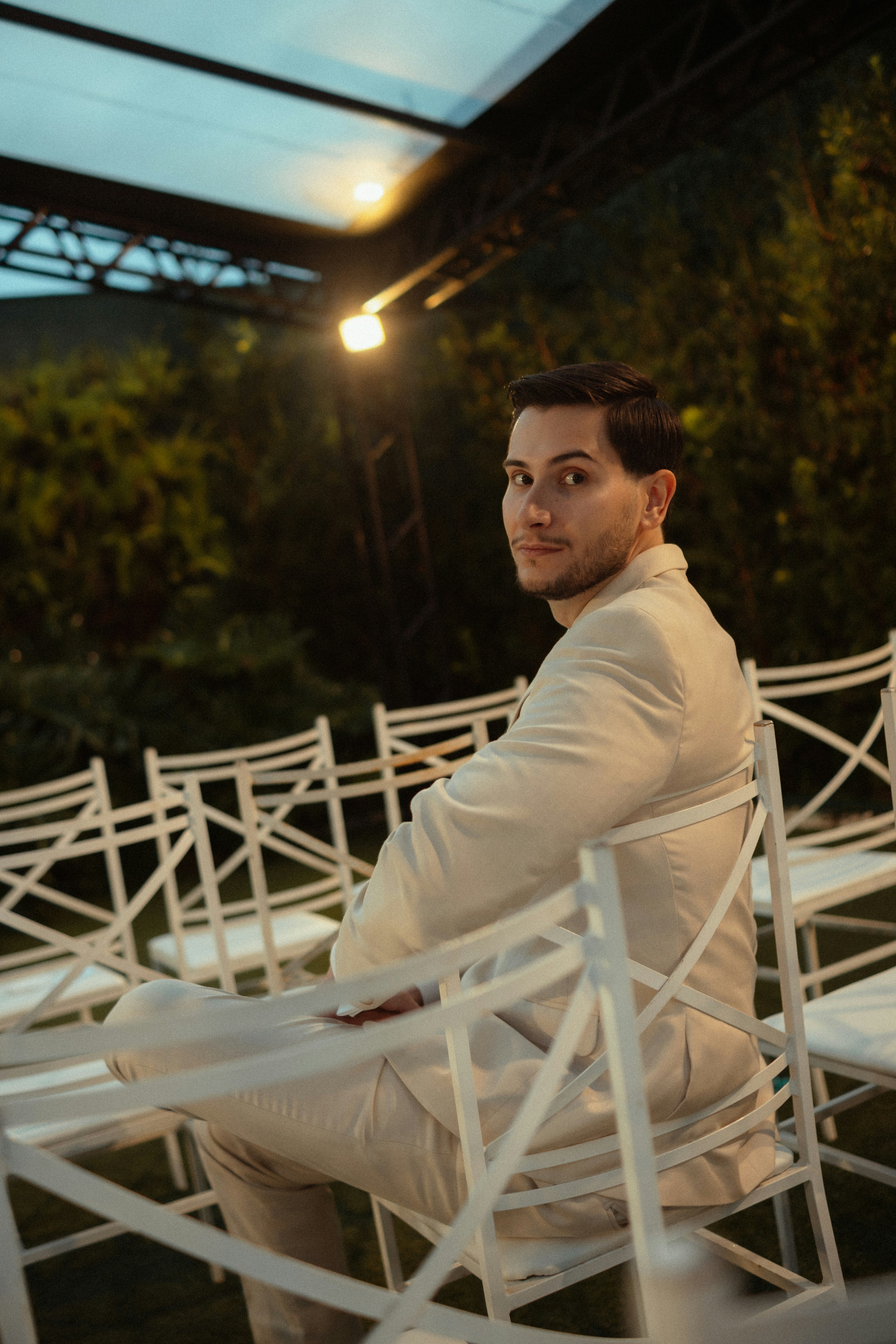 Portrait on a Moonlit Terrace: A Quiet Moment in White