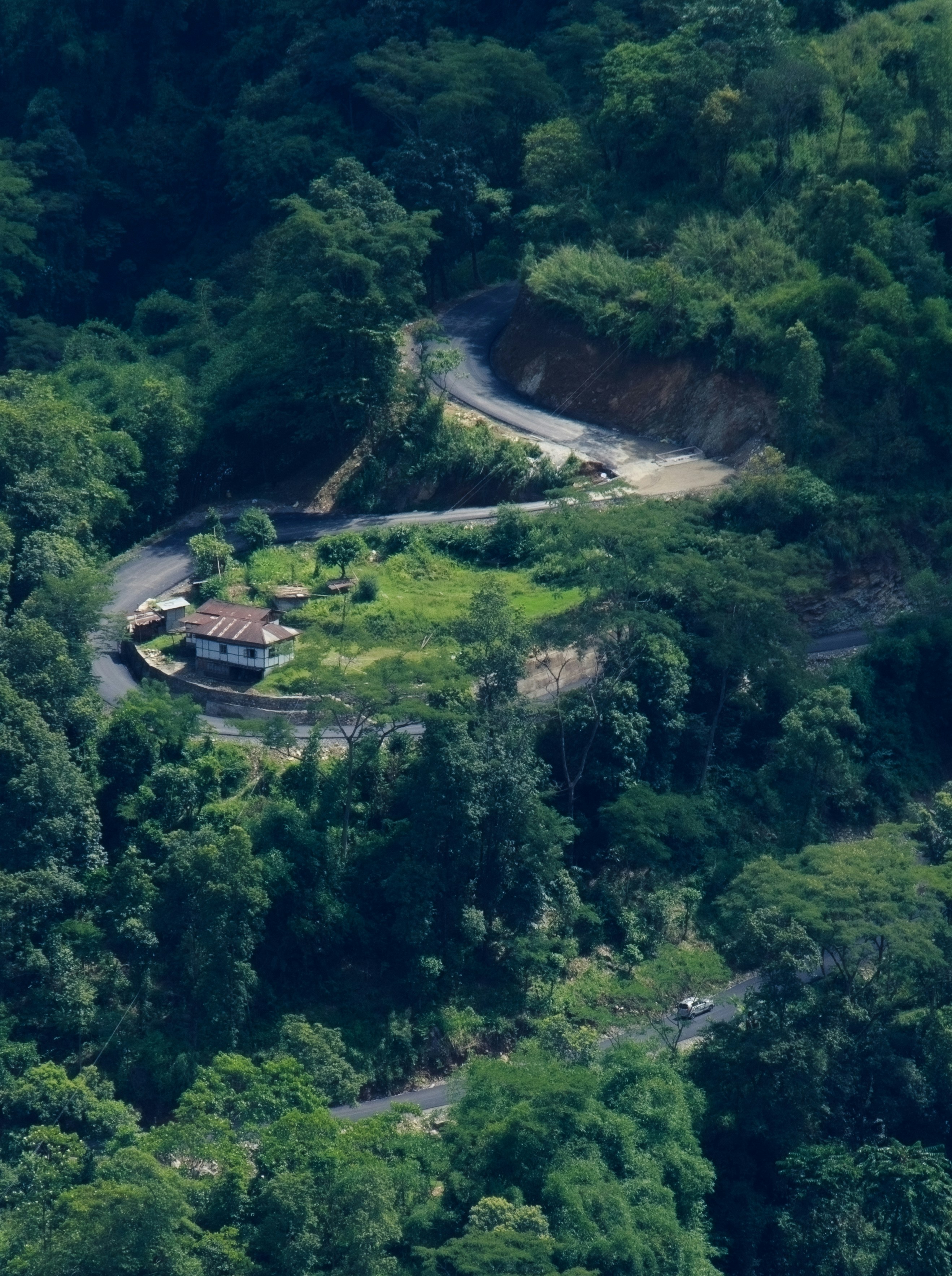 Winding Mountain Road to a Quiet Crest