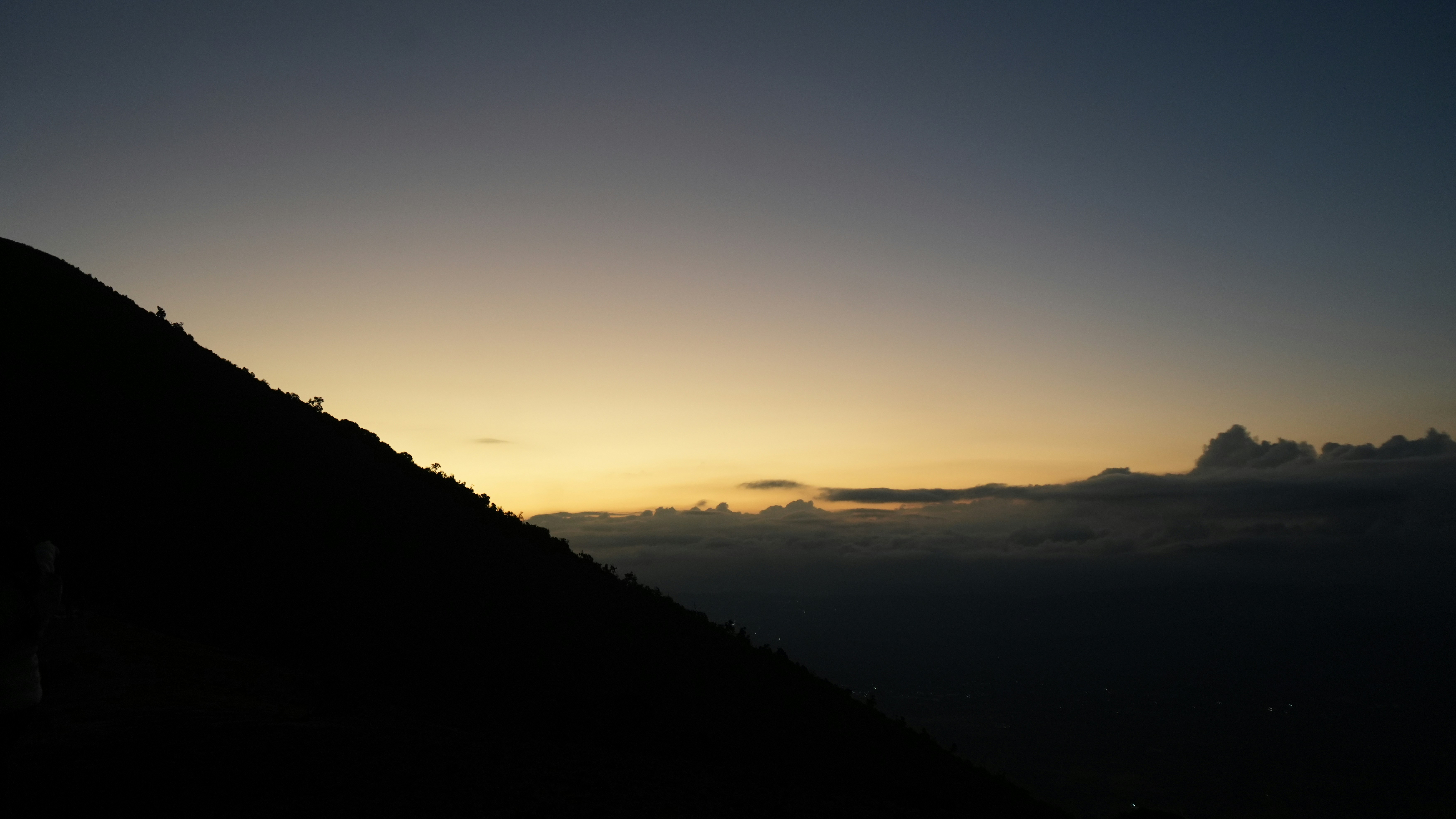 Twilight Terrace: A Silhouette over the Distant Horizon