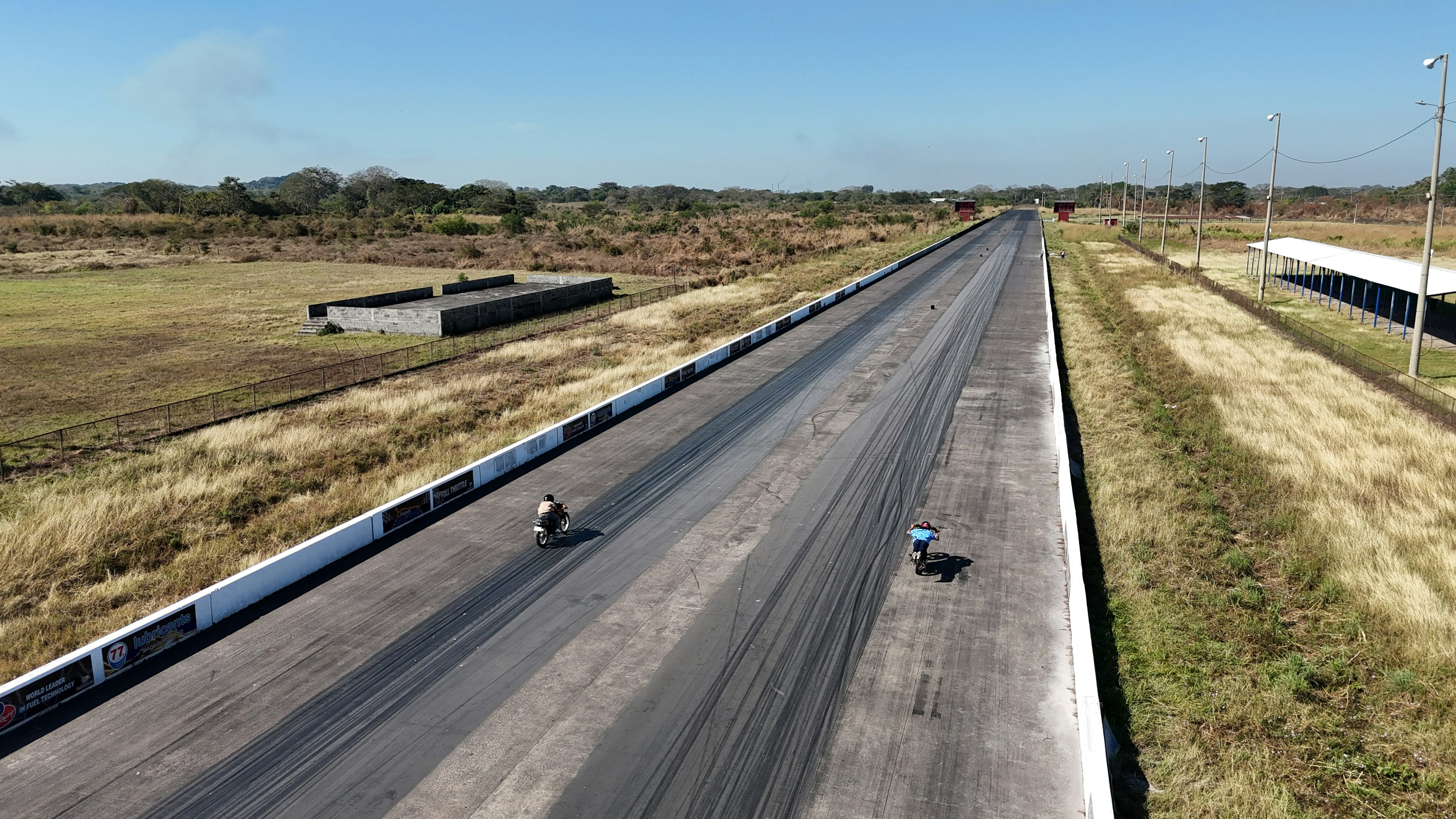 Highway to Horizon: Aerial View of a Quiet Drag Strip
