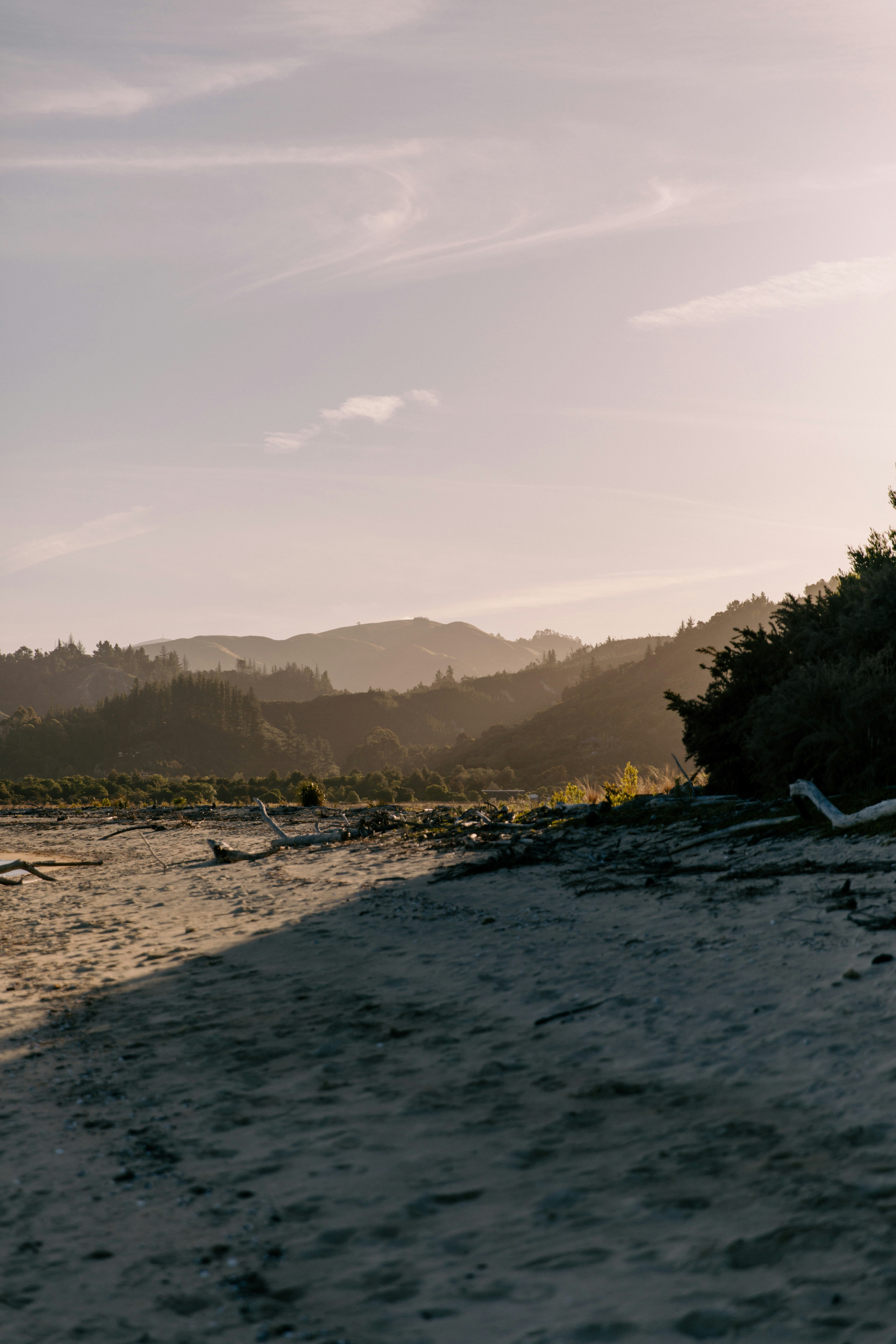 Twilight Shore: Quiet Dunes and Distant Hills