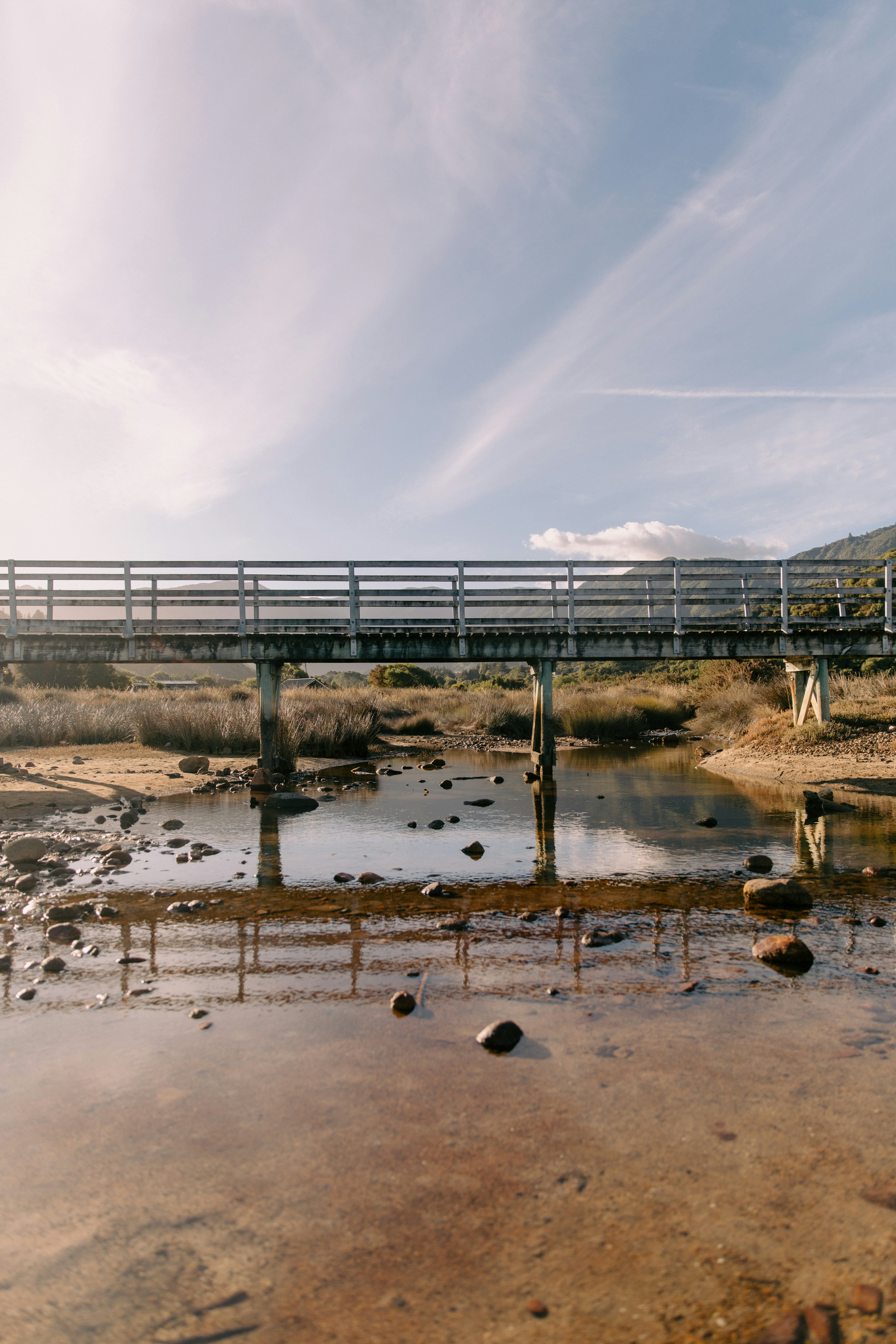 Bridge over a Quiet River at Dusk