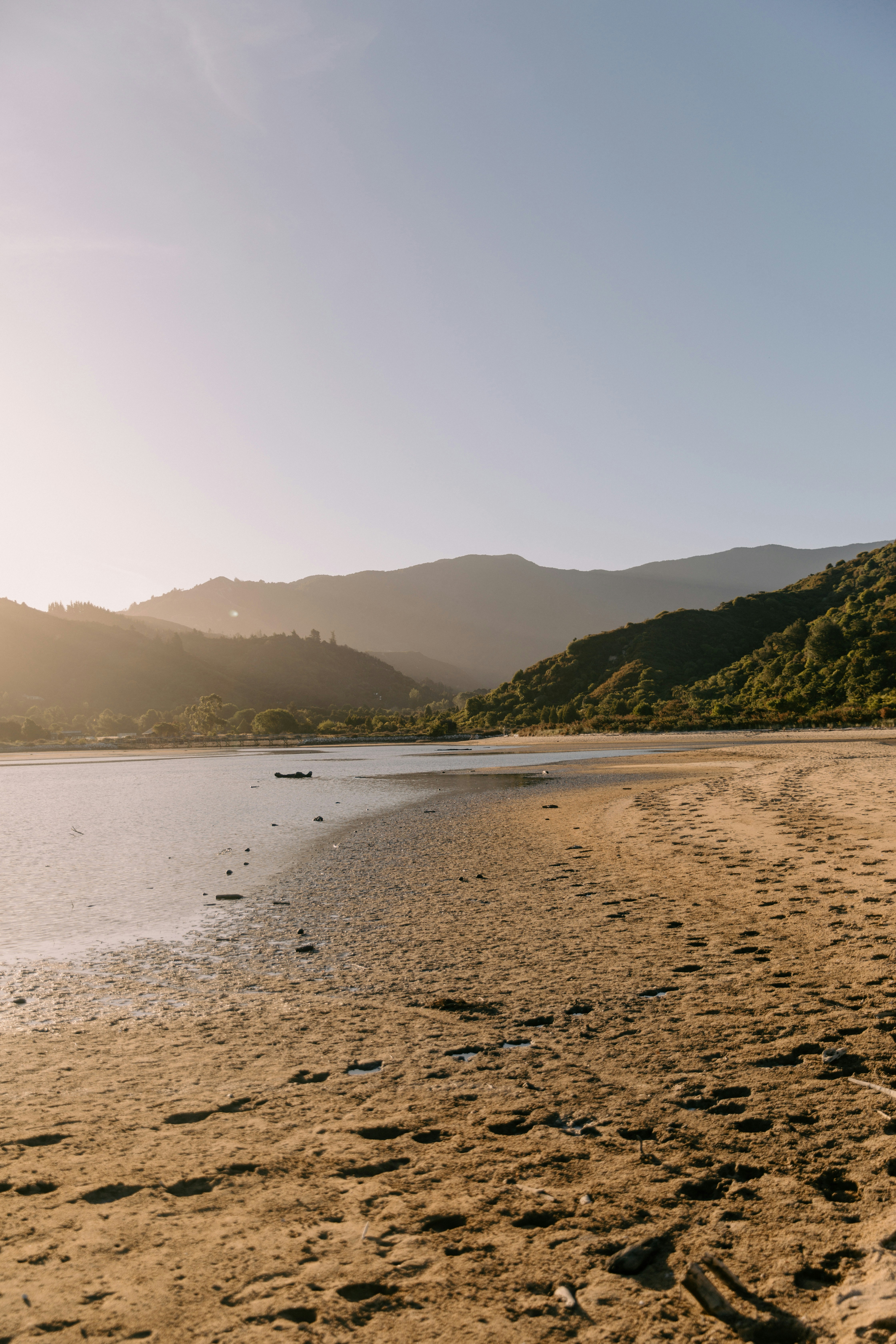 Quiet Dunes at Sunset: A Golden Shoremelting into Gentle Hills