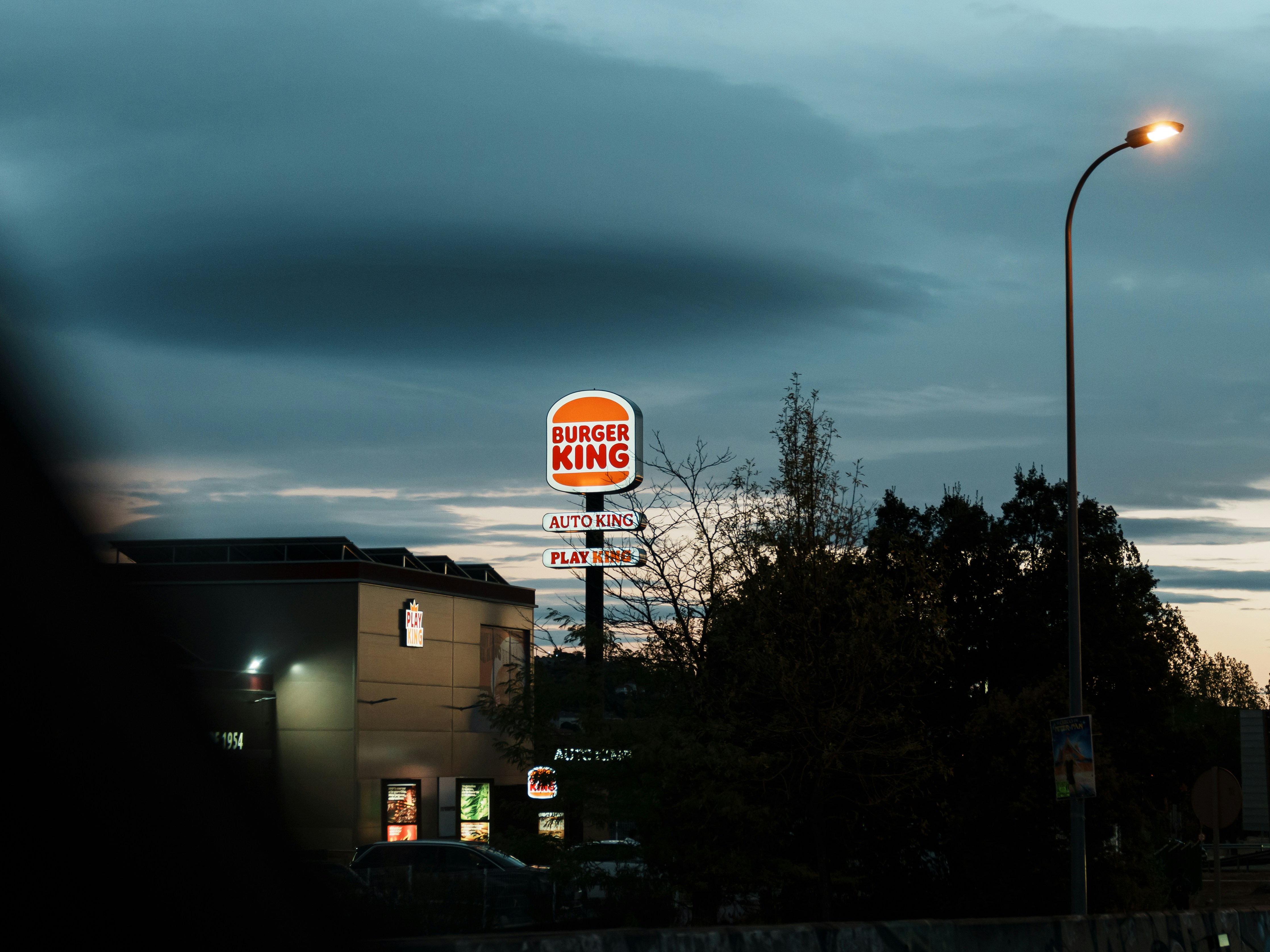 Burger King Signlit at Dusk Beyond the Urban Quiet