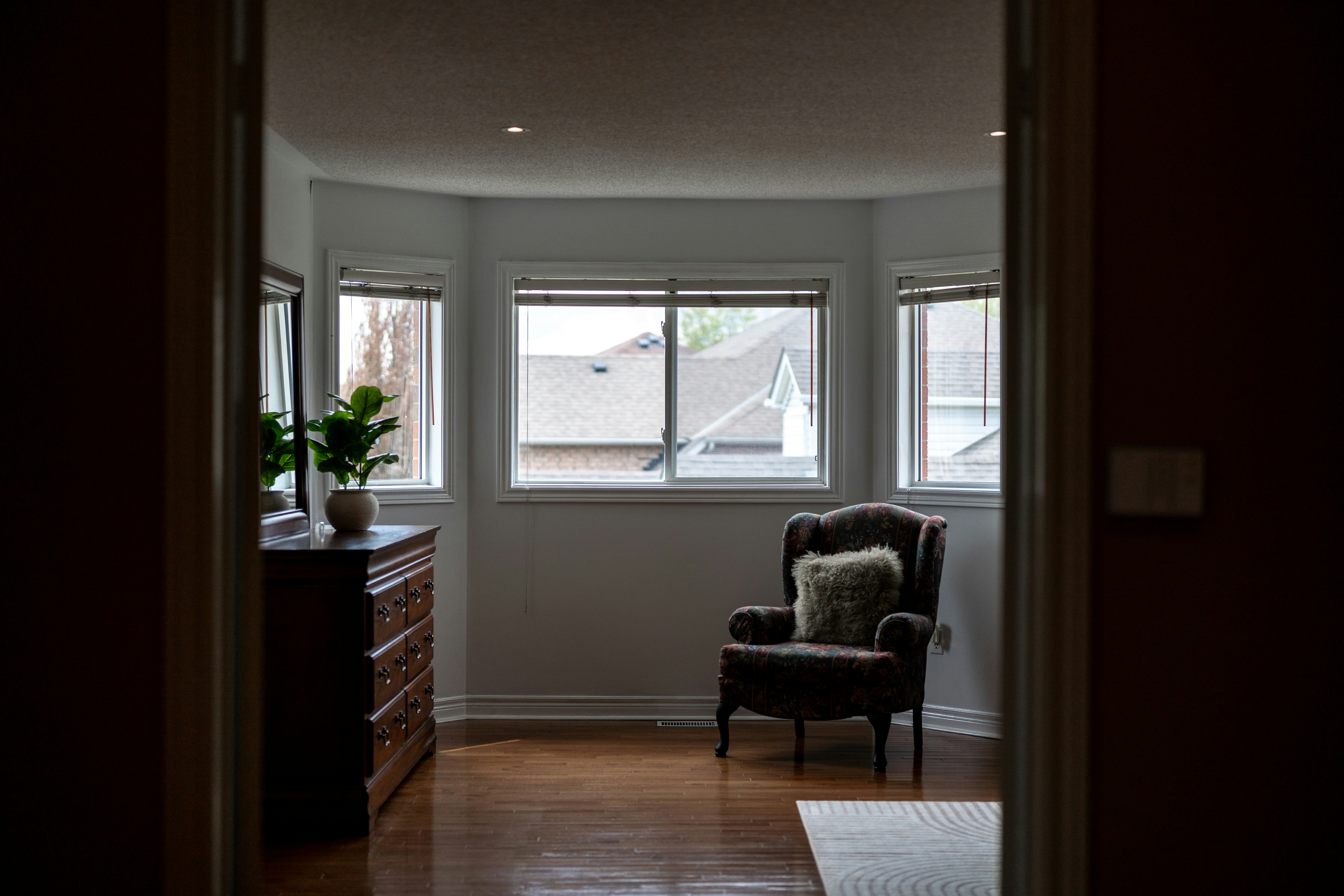 Quiet Corner: Morning Light on a Solitary Chair