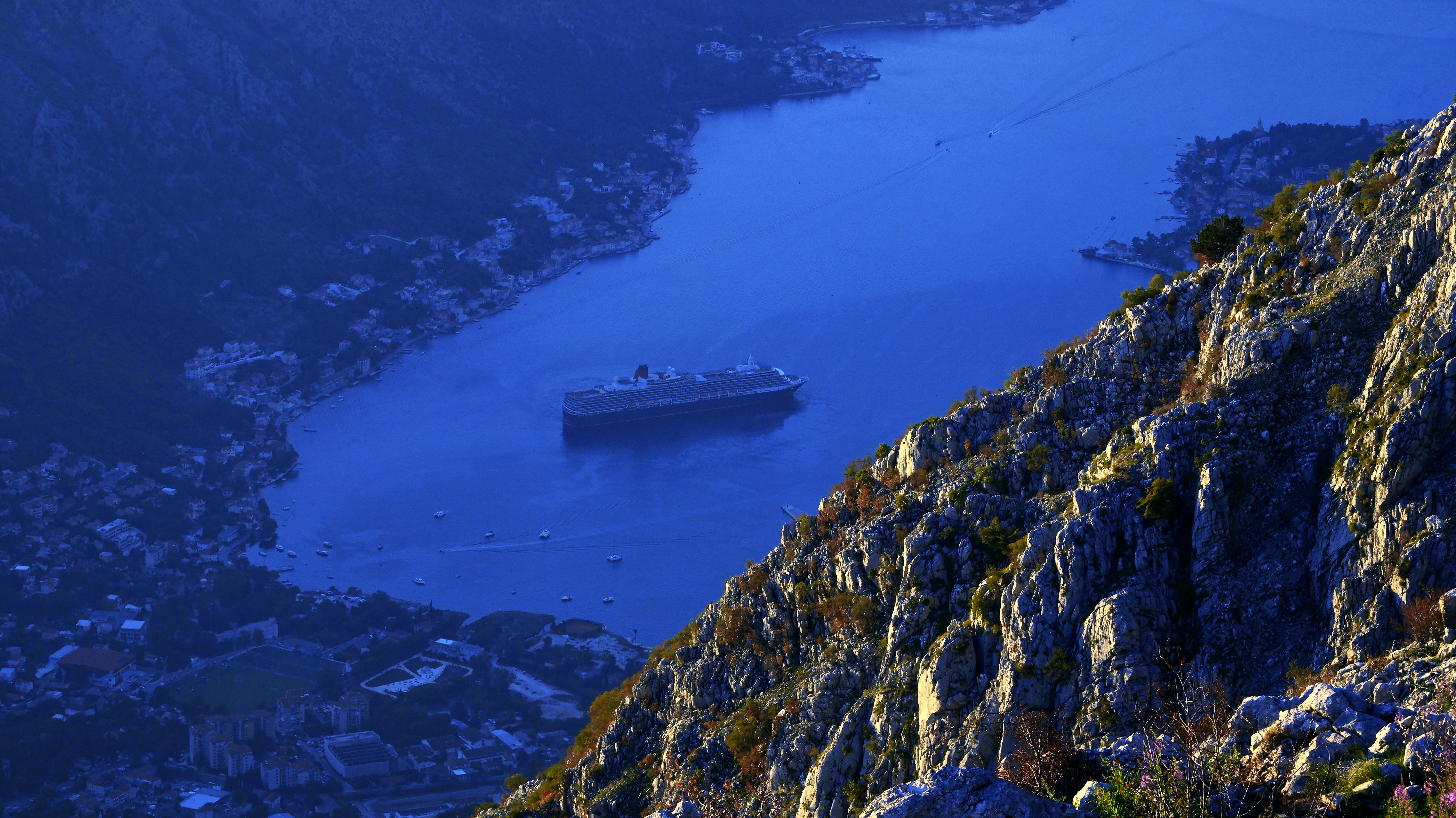 Blue Shadow over a Narrow Mountain Fjord