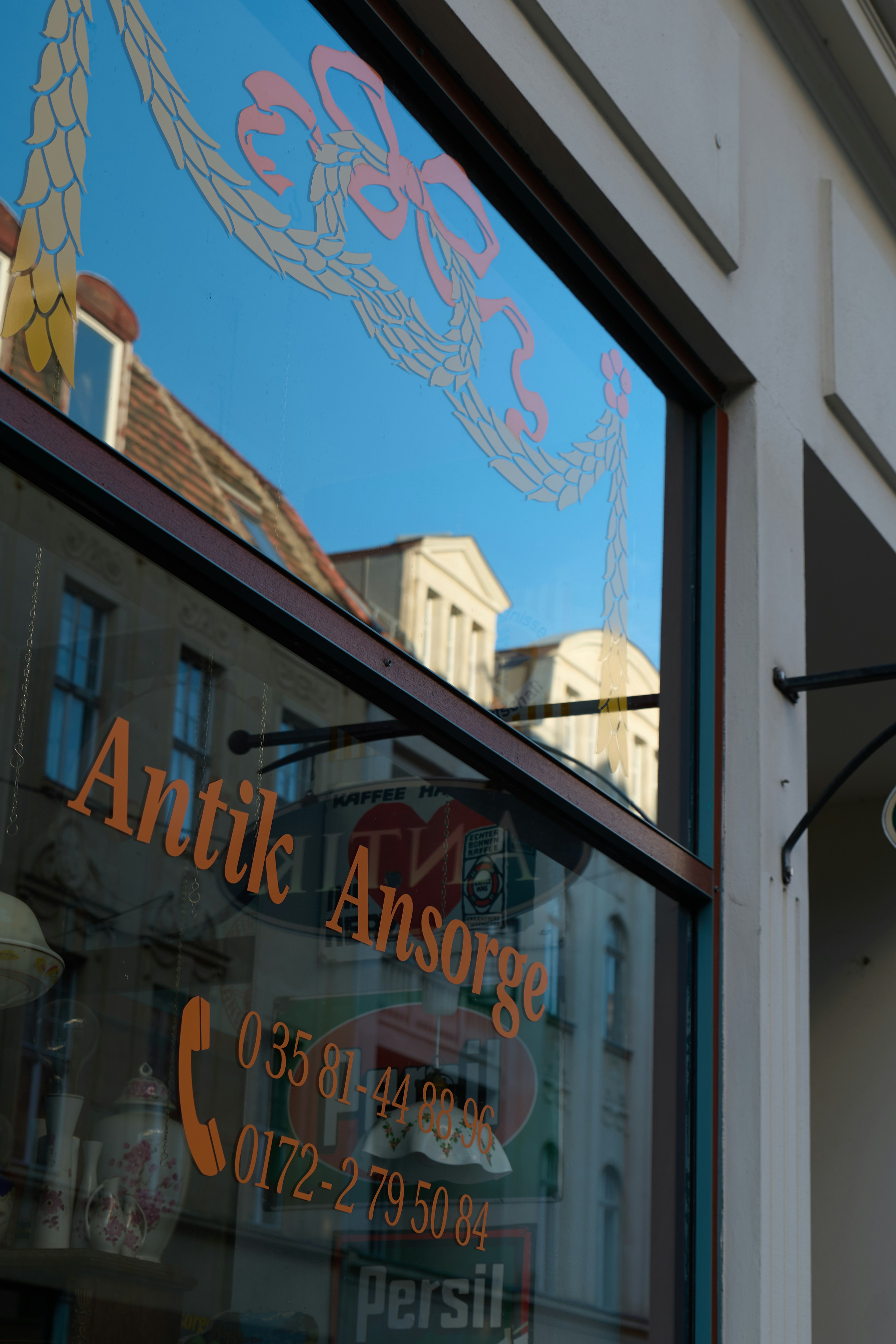 Amber Echoes: A Vintage Shopfront in Shaped Glass