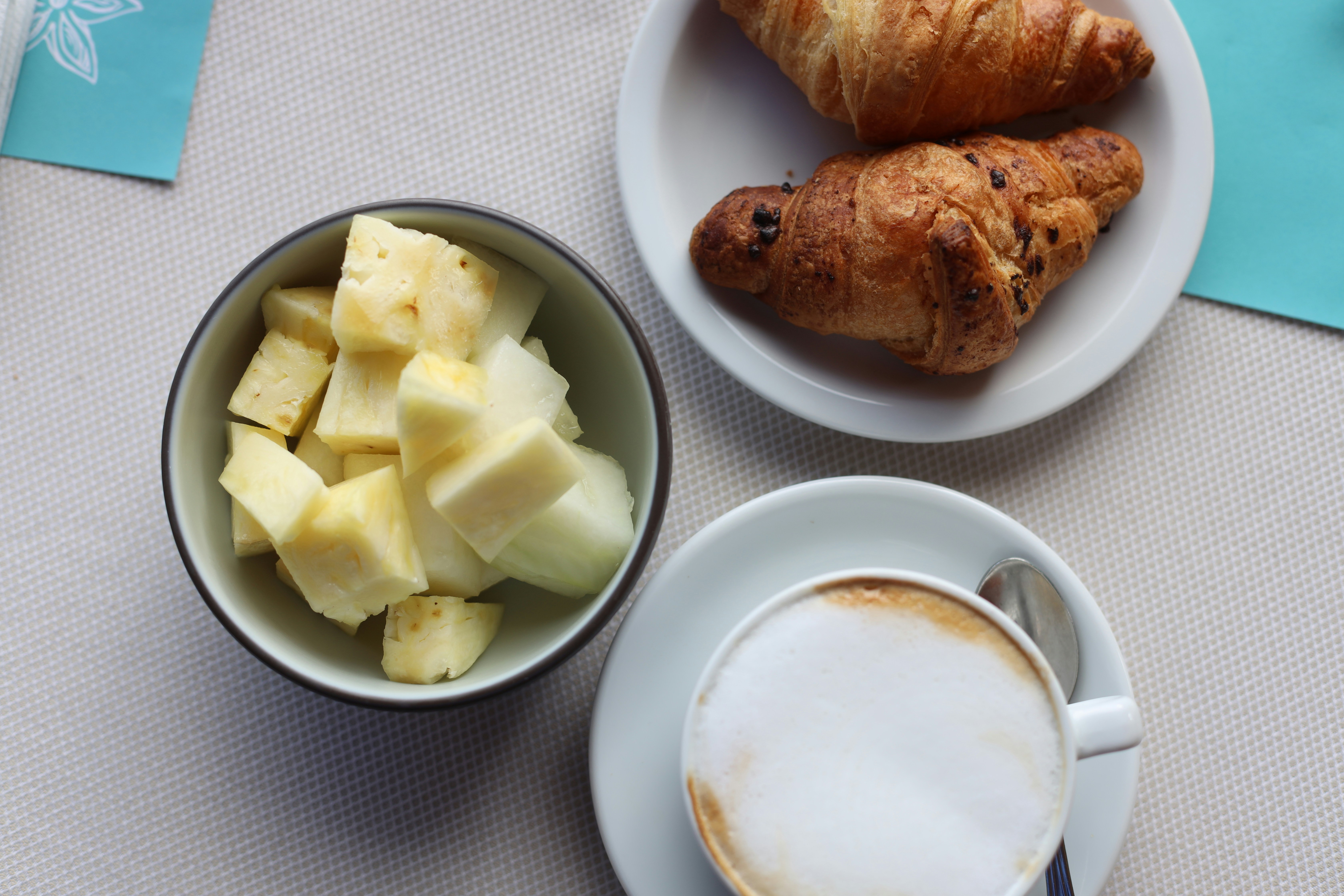 Morning Pastries and Pineapple Squares: A Cozy Tabletop Moment