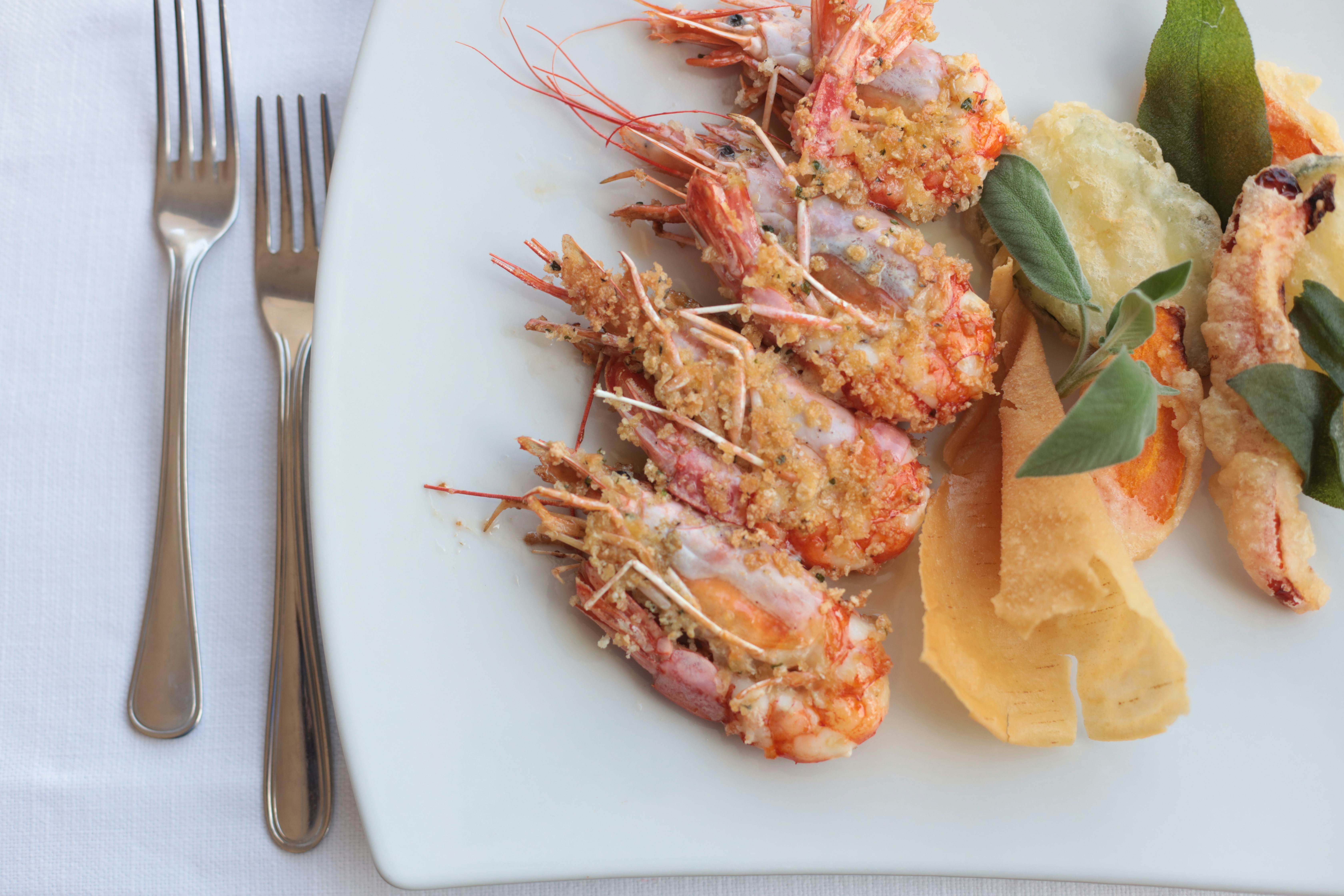Golden Shrimp Terrace: A Plate of Crispy Shrimp with Citrus Garnish