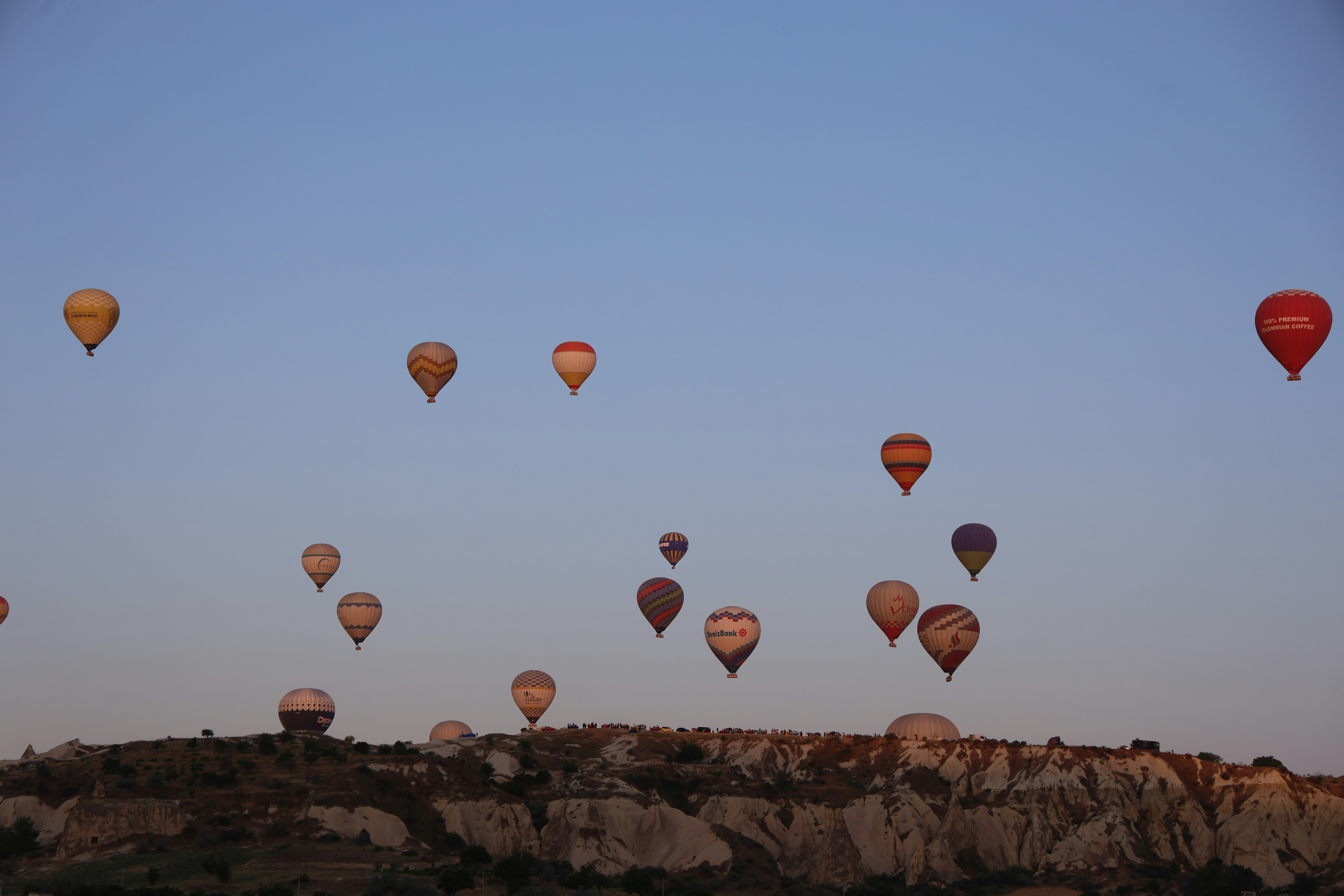 A Sky Full of Balloons Over the Distant Ridge