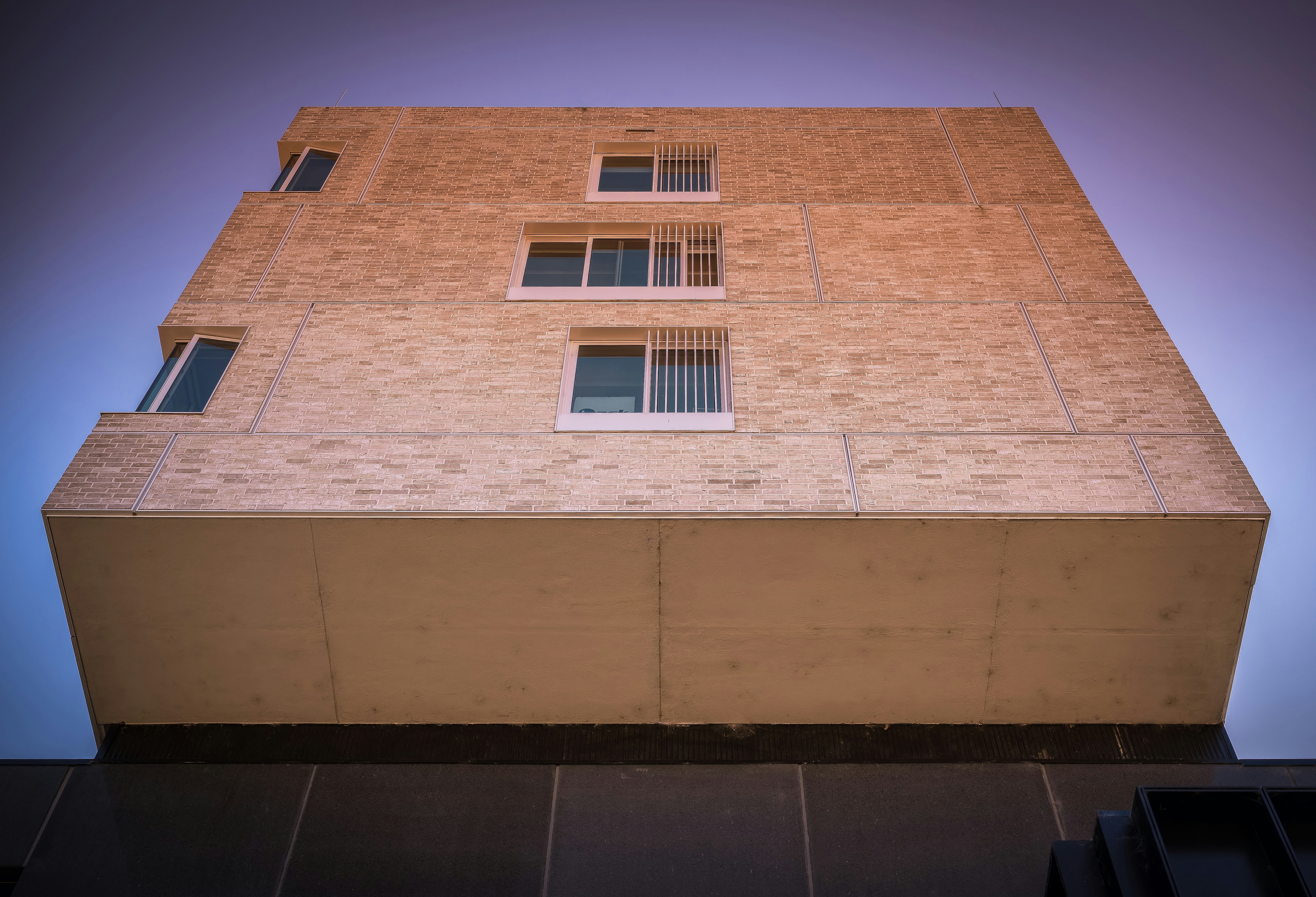 Angular Brick Facade Reaching Toward the Sky