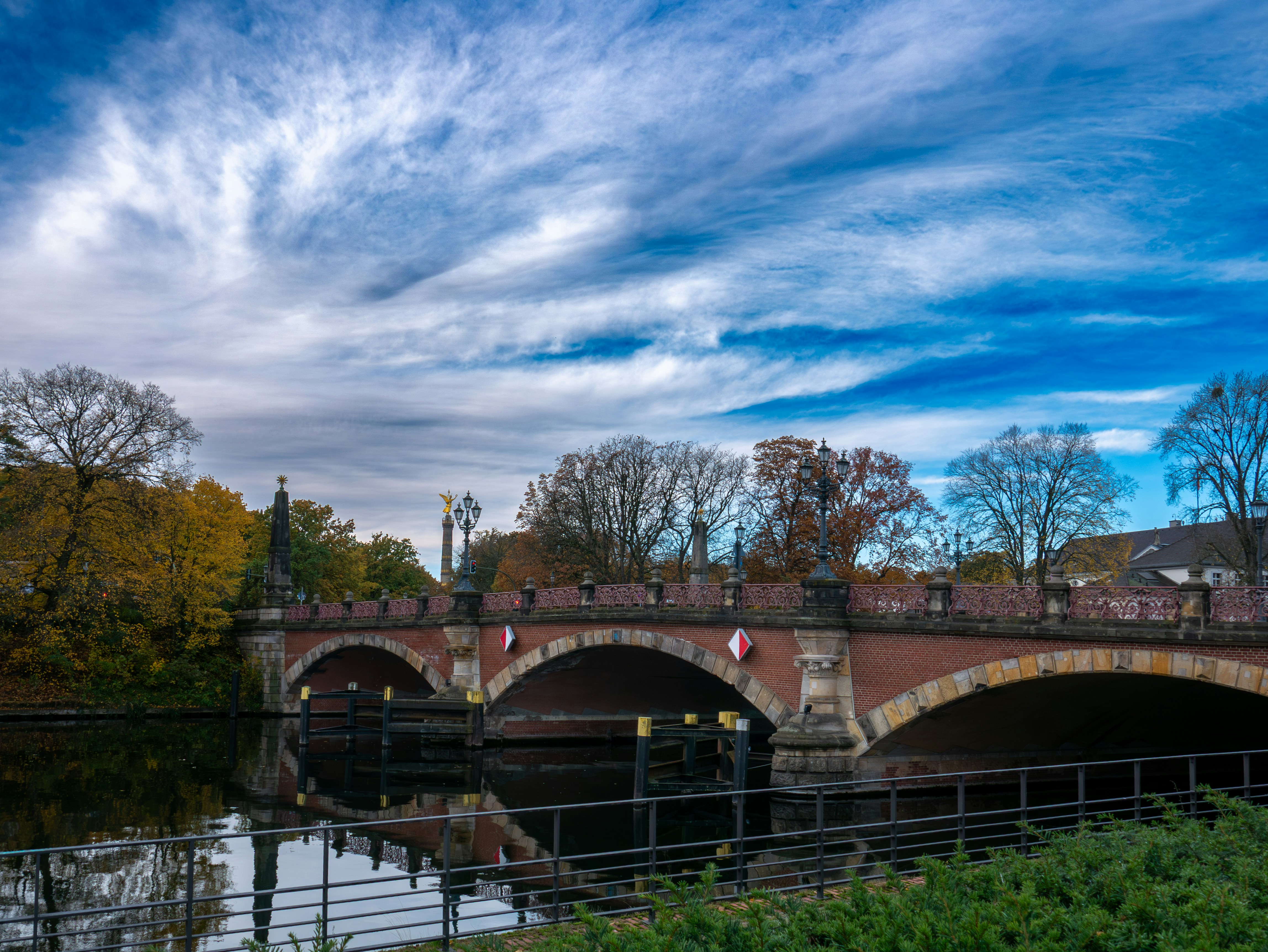 Stone Arches and Autumn Reflections