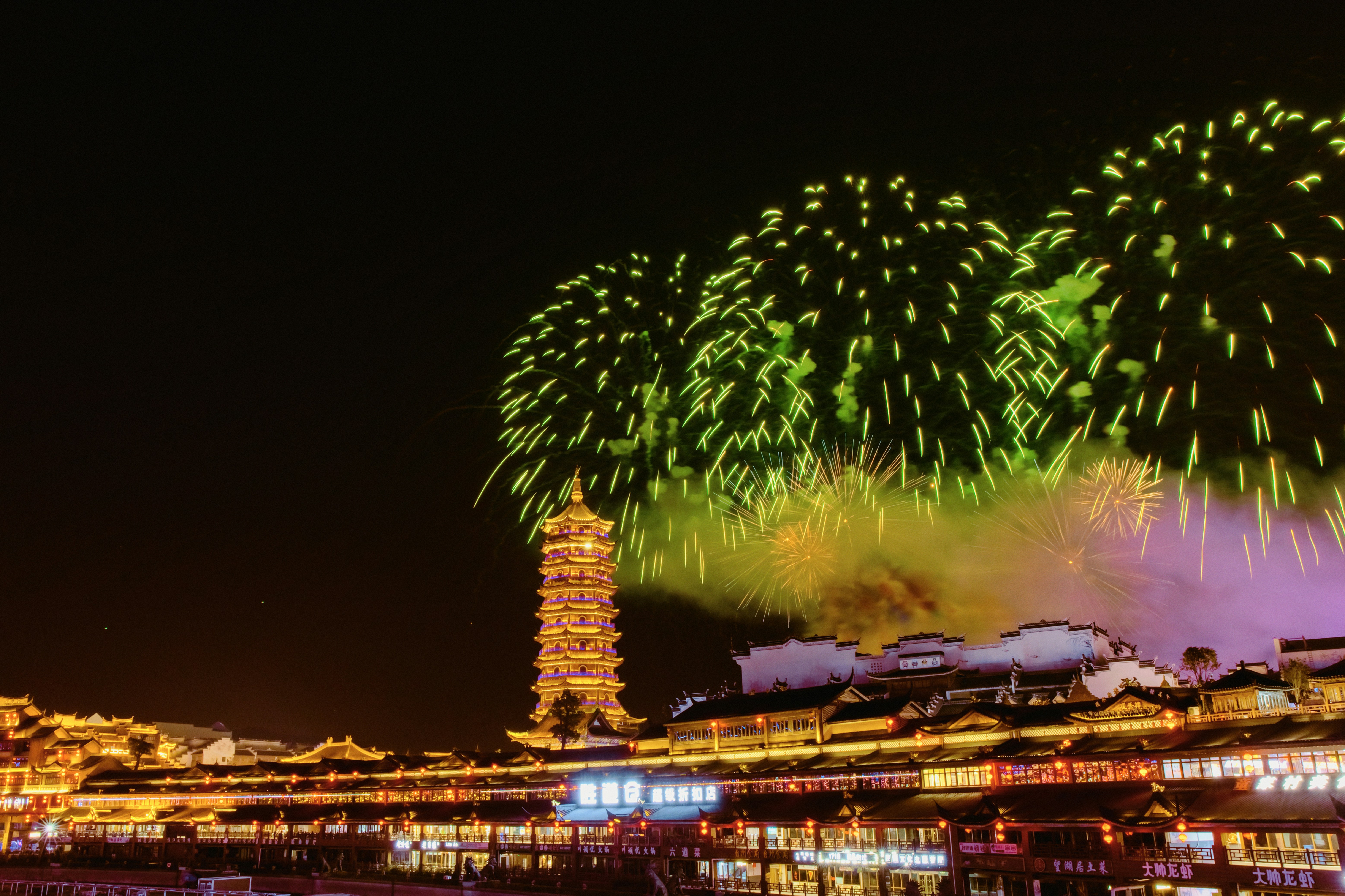 Nightscape Symphony: Fireworks Over a Historic City Gate
