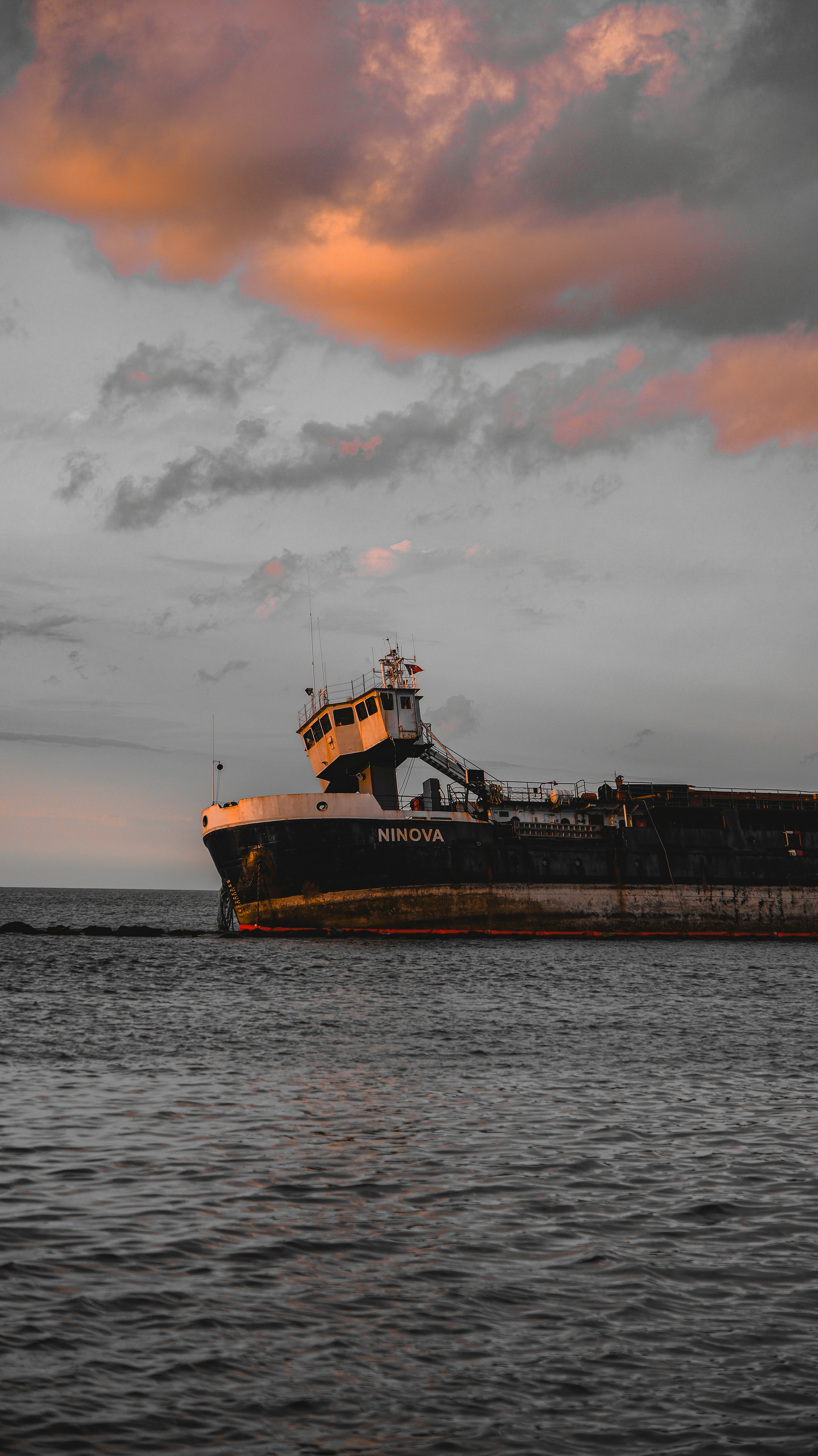 Bare Horizon, Heavy Hull: A Vessel at Dusk