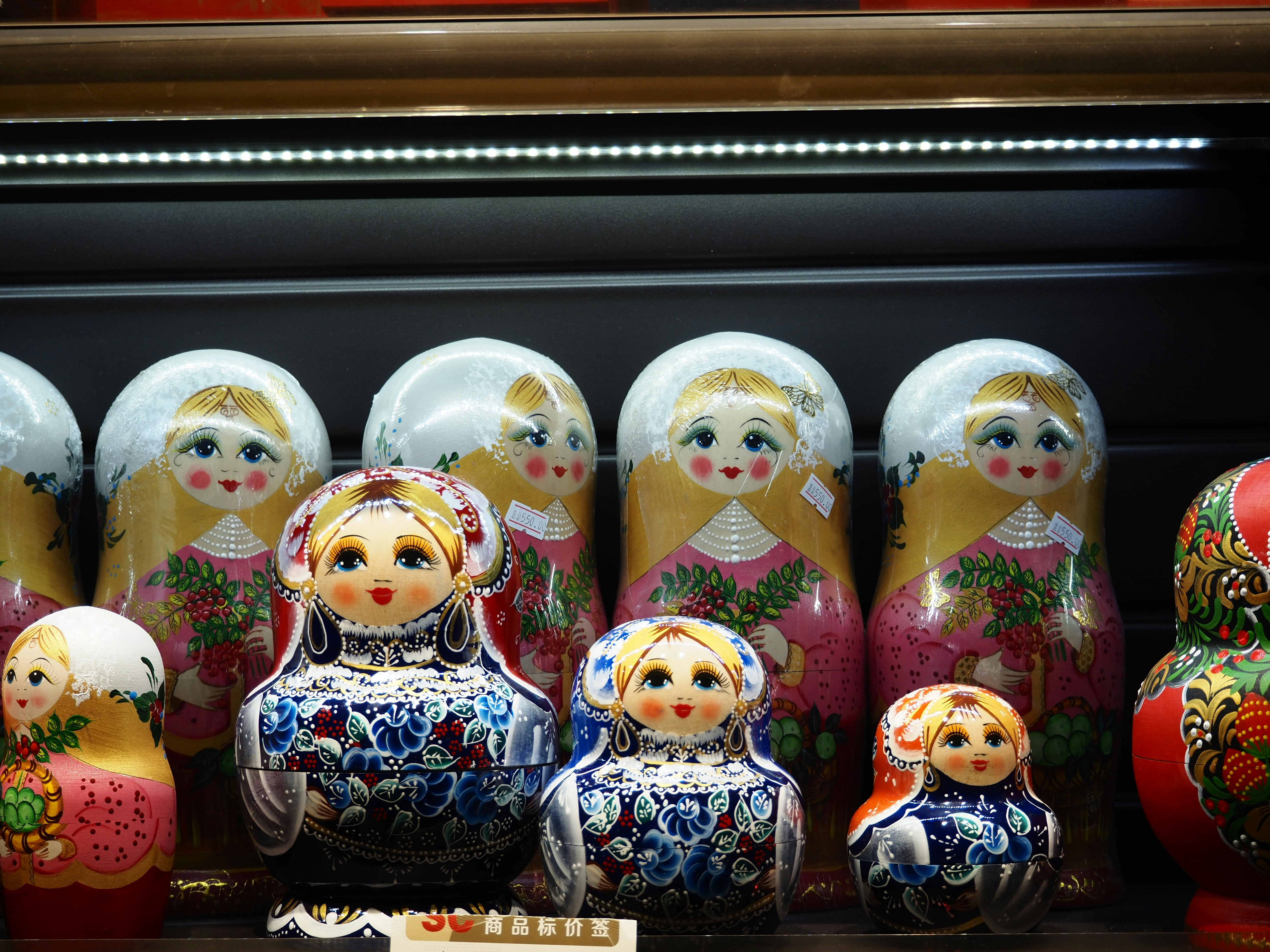 Matryoshka Parade: Rows of Painted Faces in a Russian Nesting Style