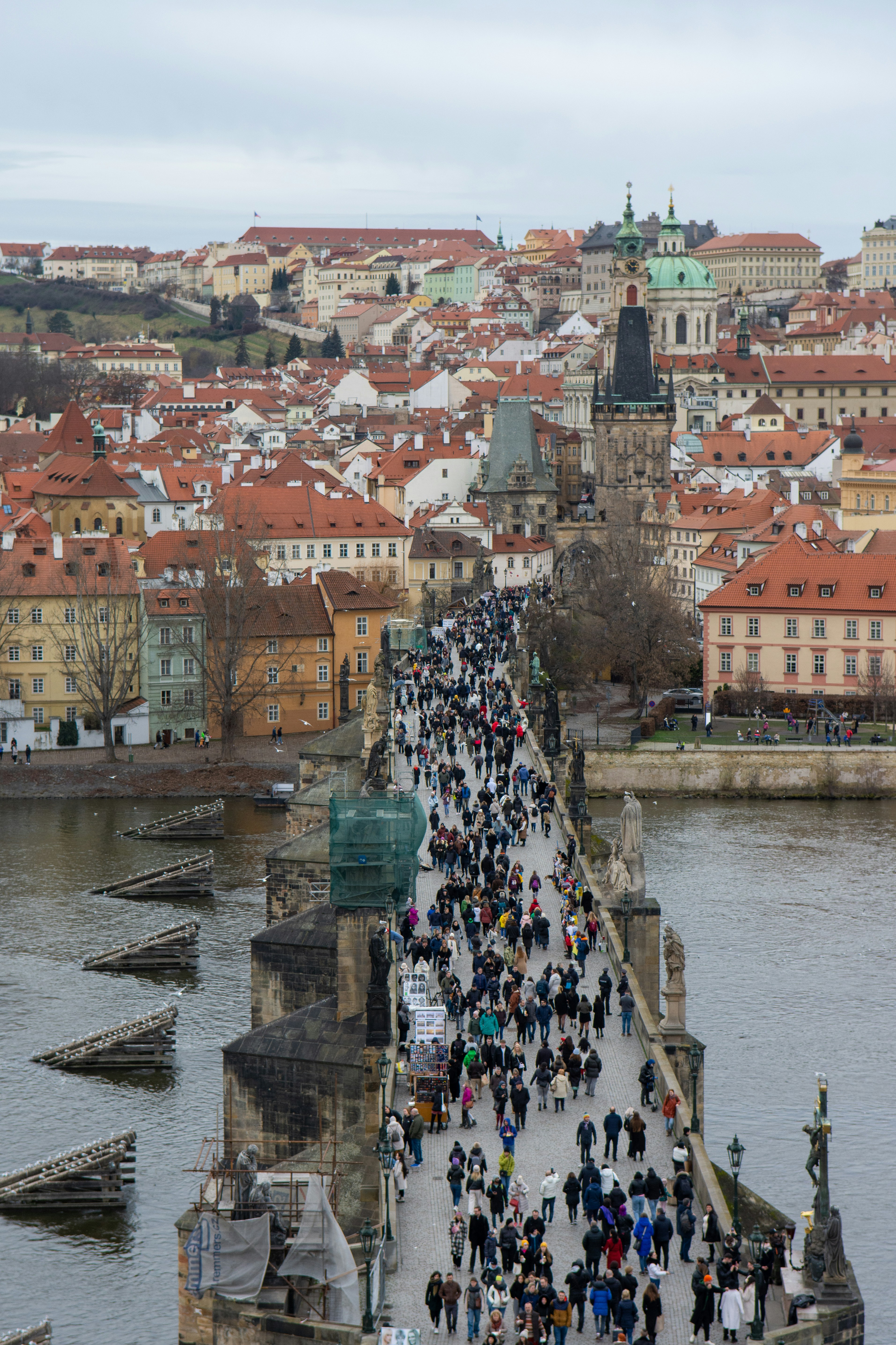 Charles Bridge in a Sea of Passersby: A Timeless Prague Walk
