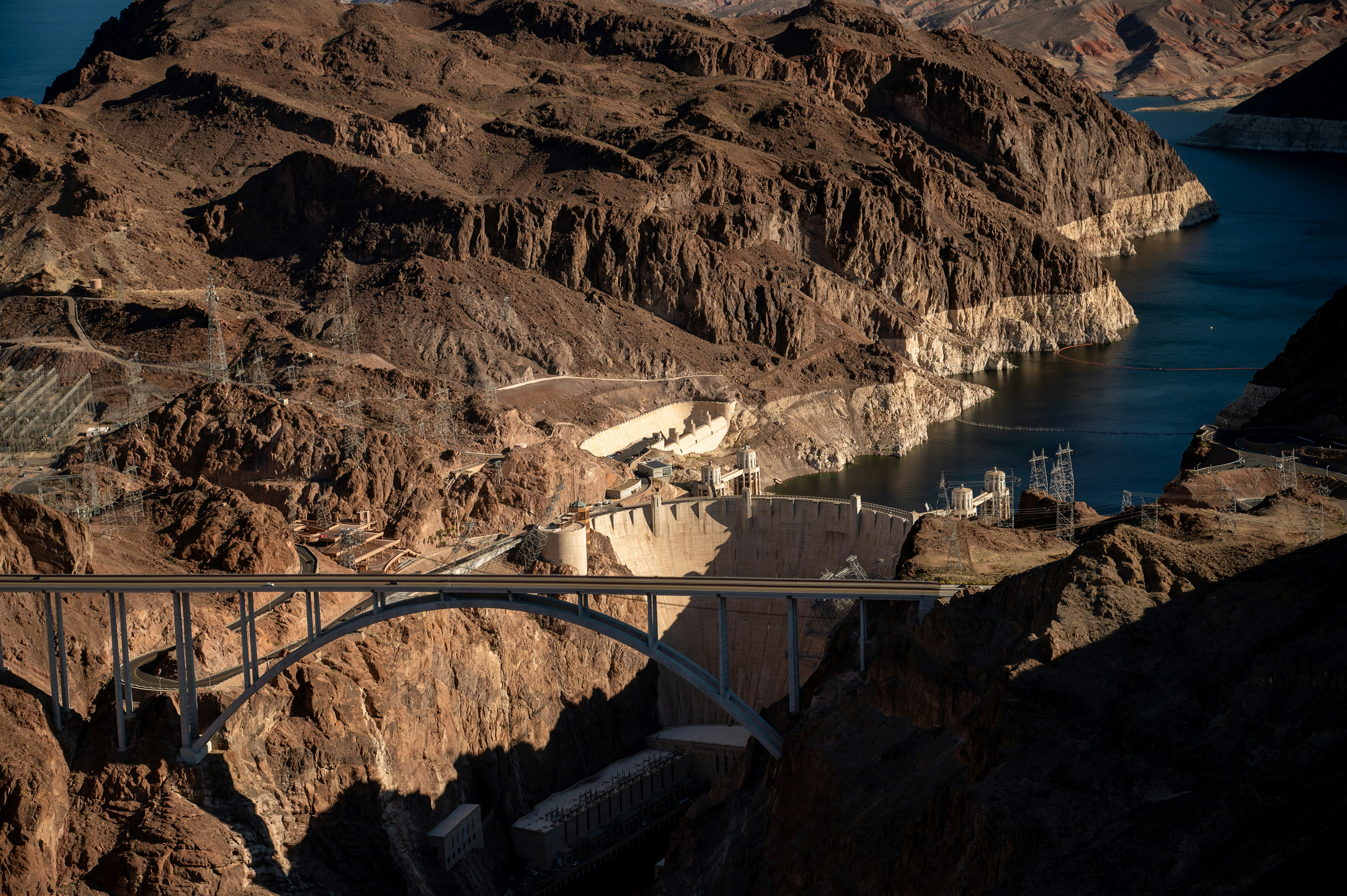 Ridge-and-Reservoir: A Dam Bridge Surrounded by Jagged Canyon