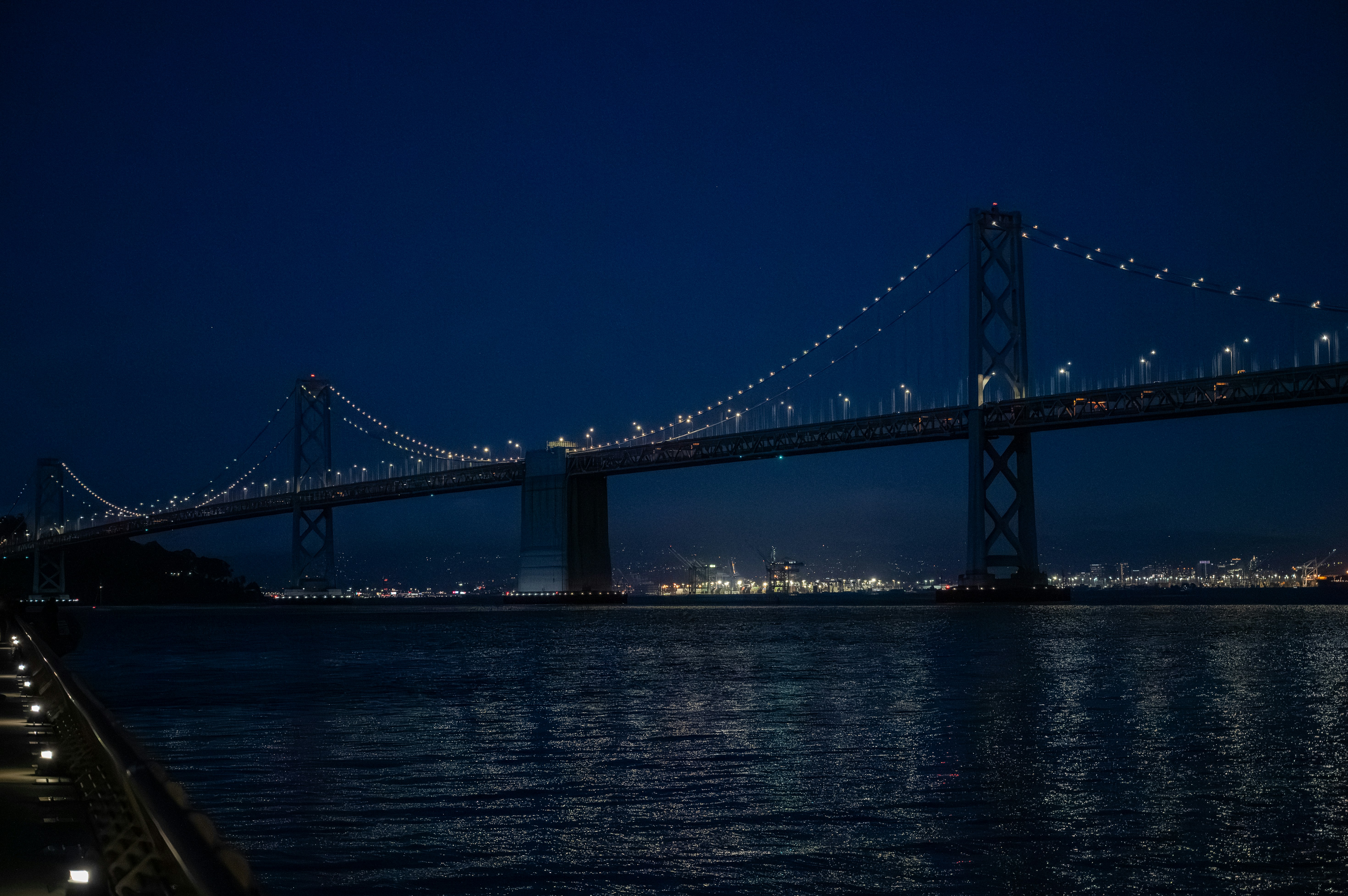 Midnight Span: Lights along the Bay Bridge Echo the Water's Quiet