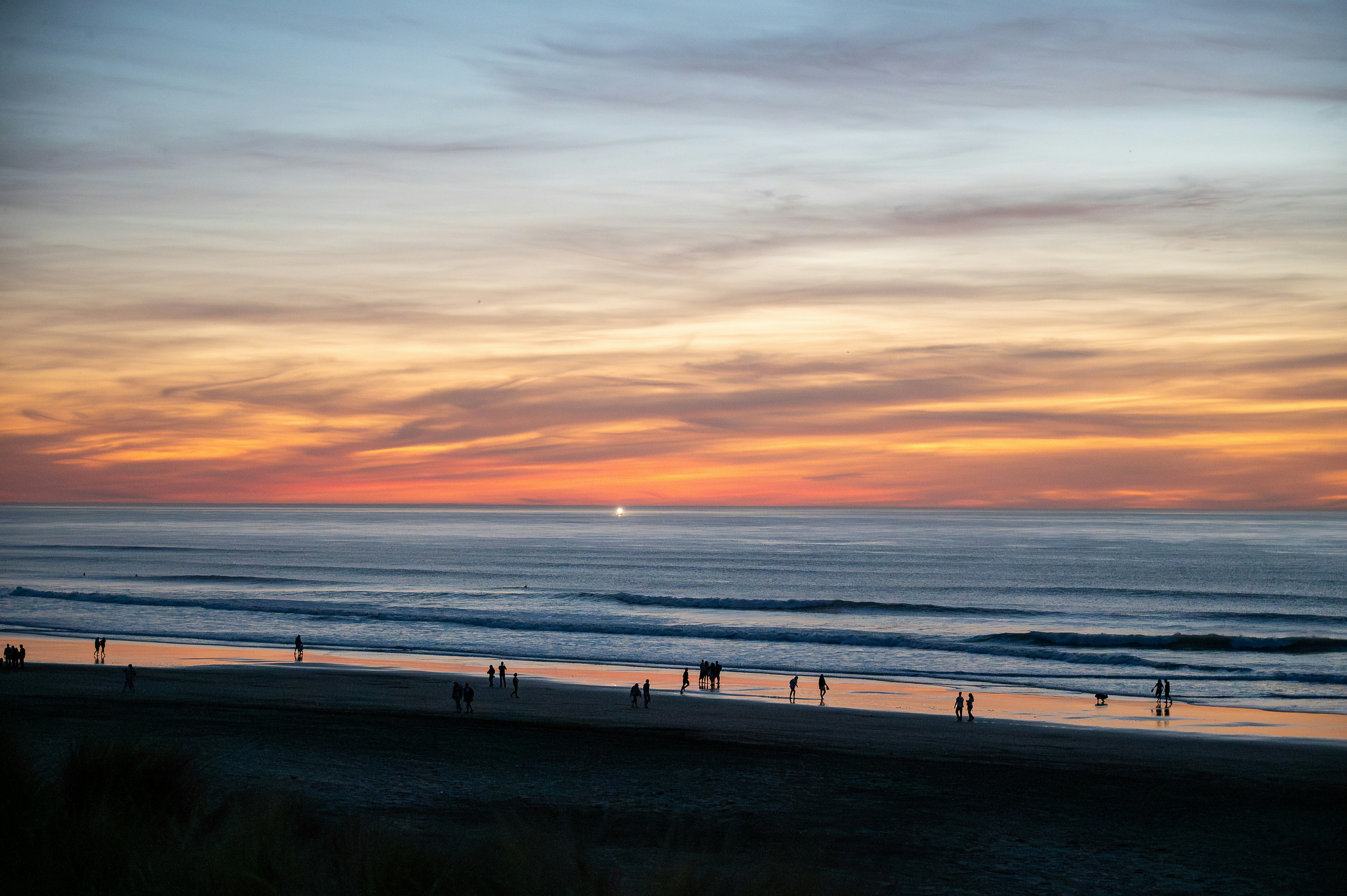 Dusk on the Quiet Shore: Sunset Speaks in Silhouetted Tide
