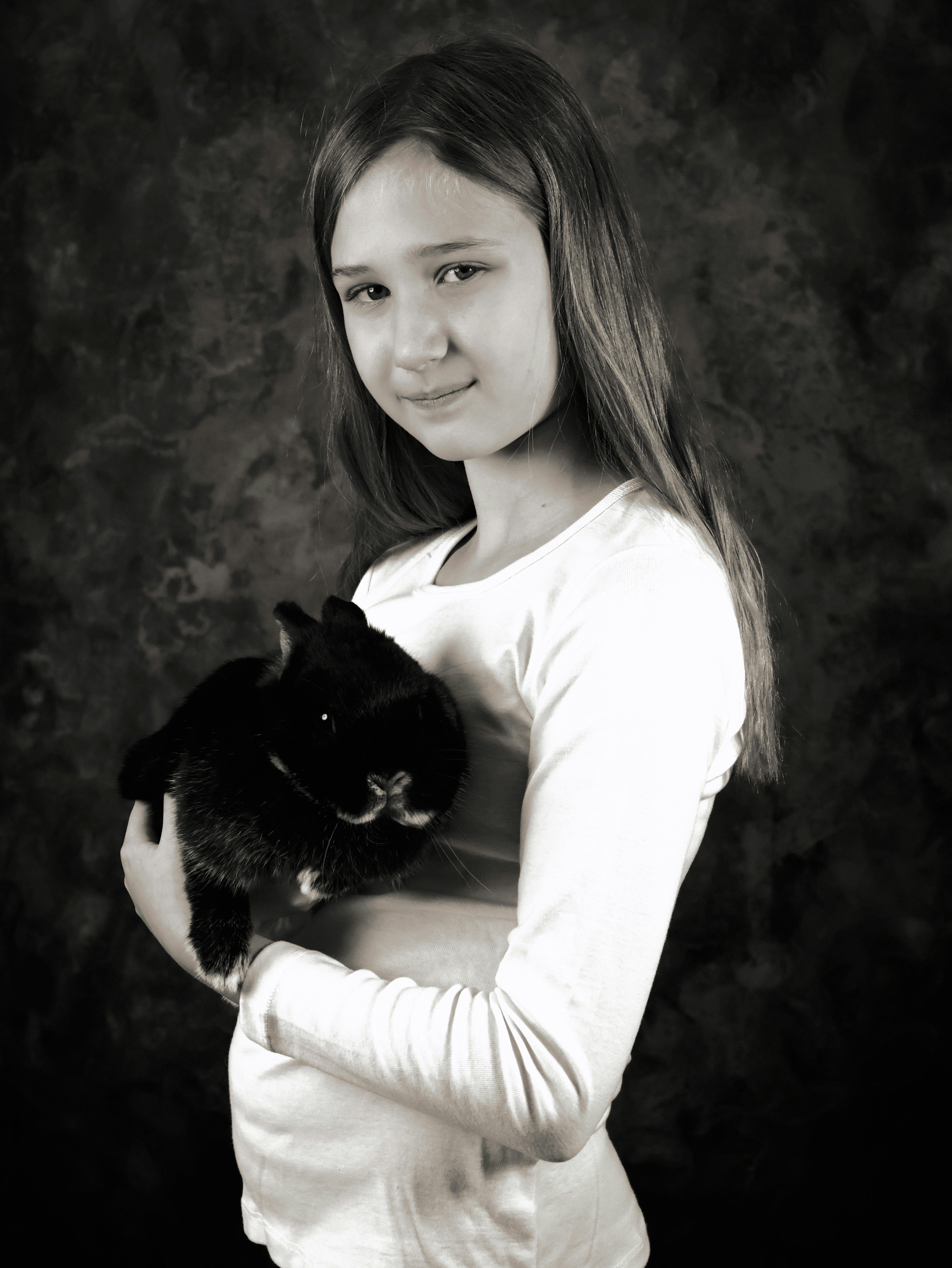 Quiet Expression, Gentle Bond: A Girl with a Black Cat