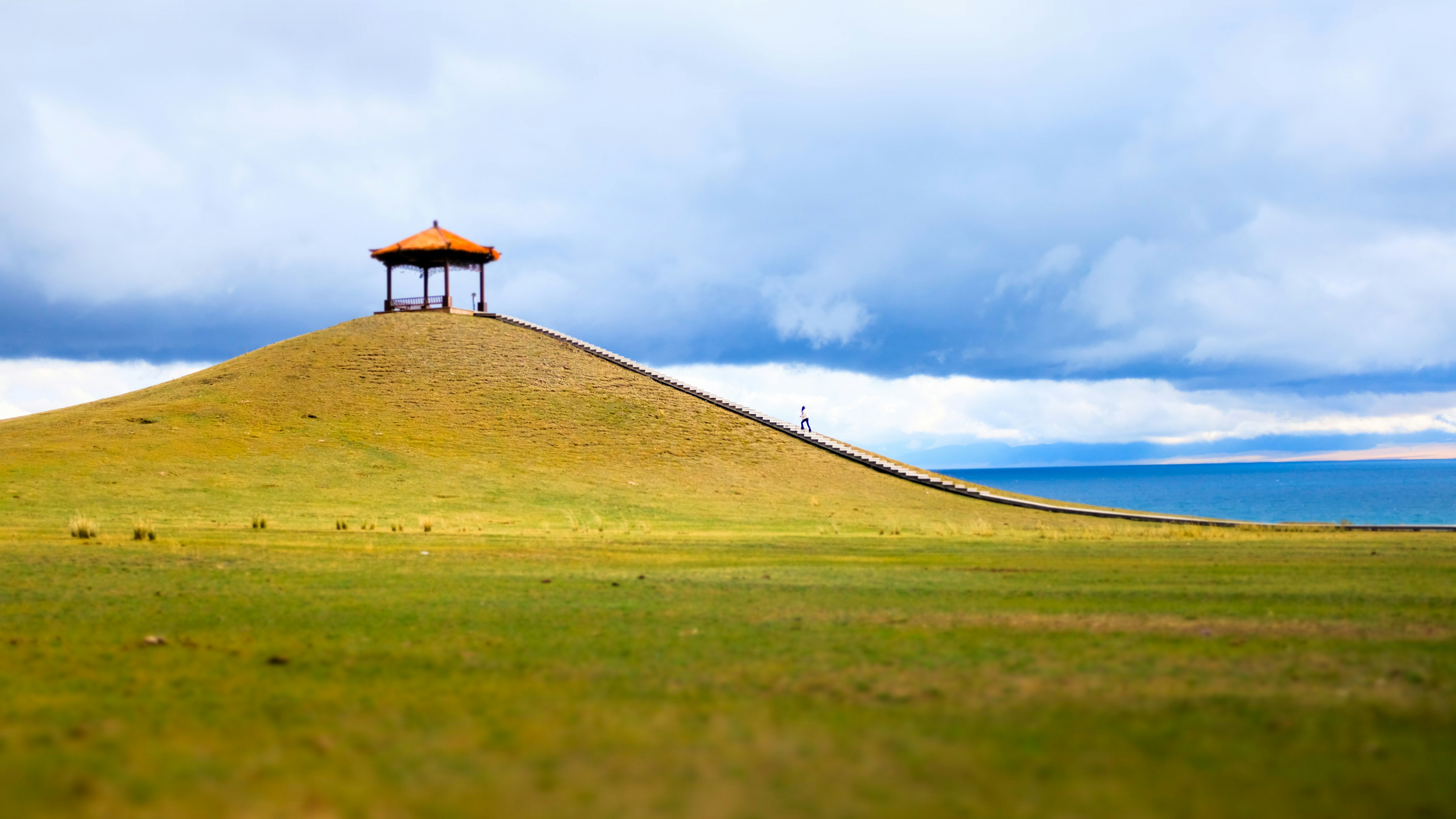 Hilltop Pavilion Against a Vast Sky