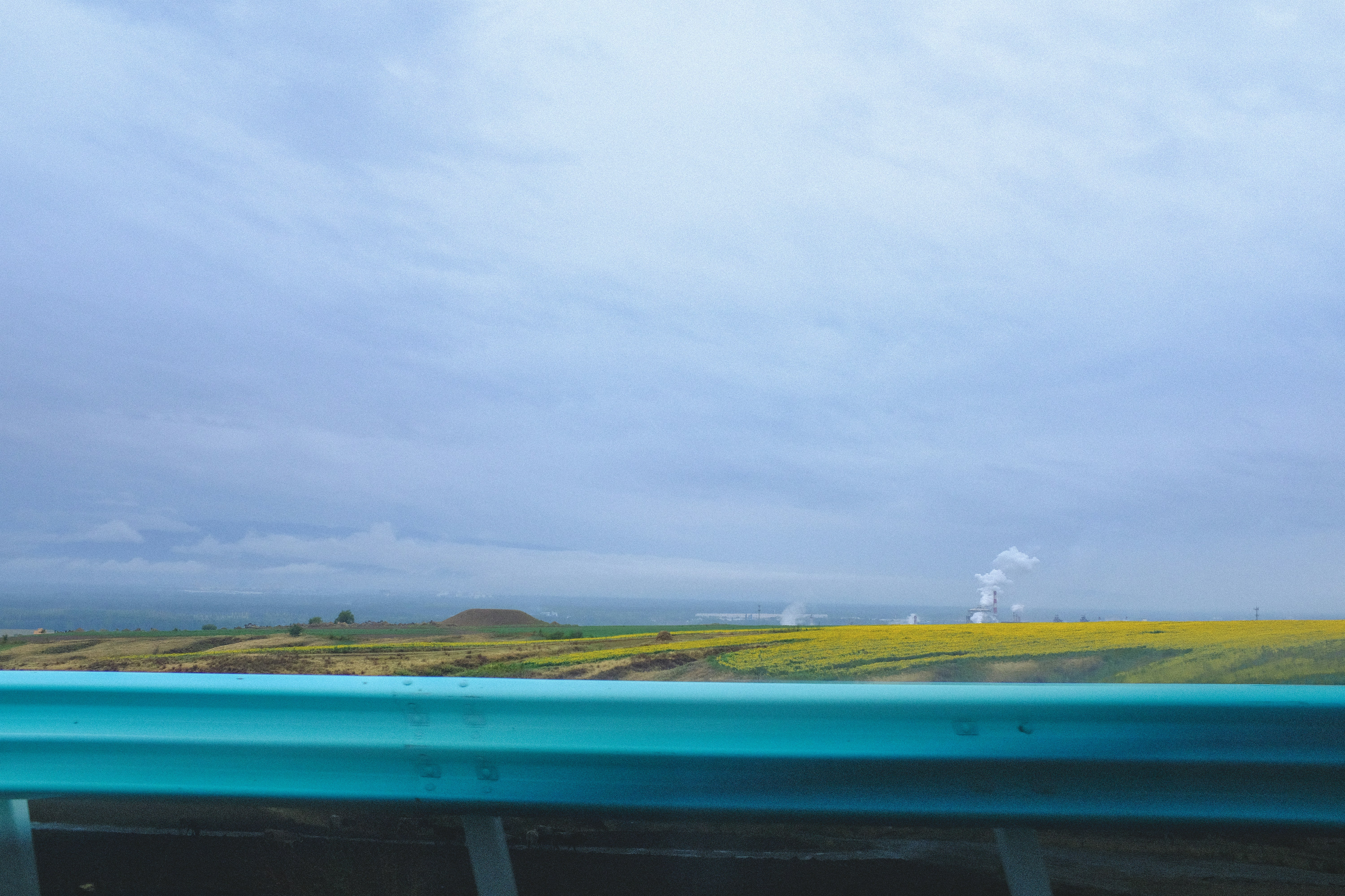 Turquoise Barrier Over a Mainland Horizon
