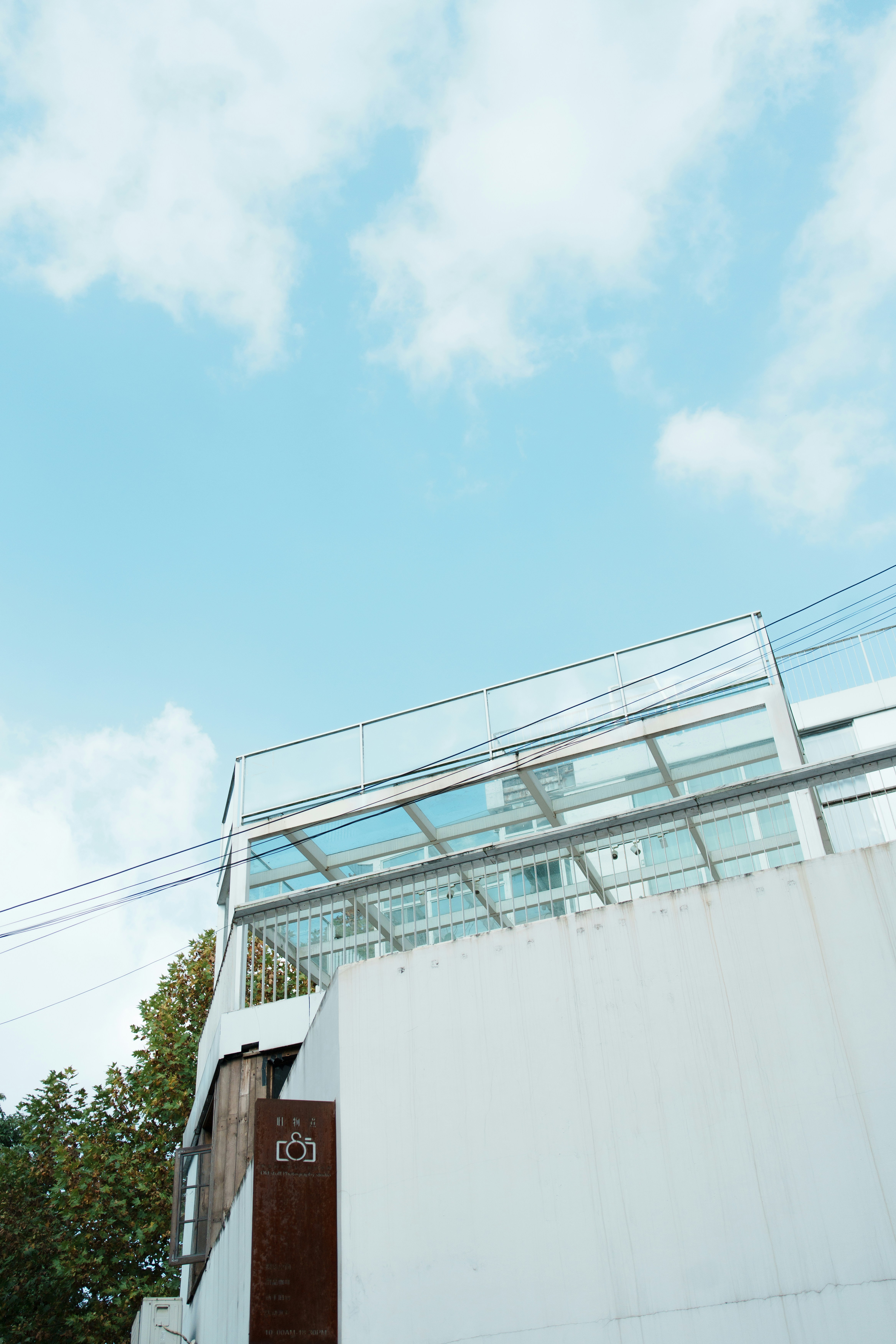 Architectural Edge: Glass Overlay on a Modern Terrace