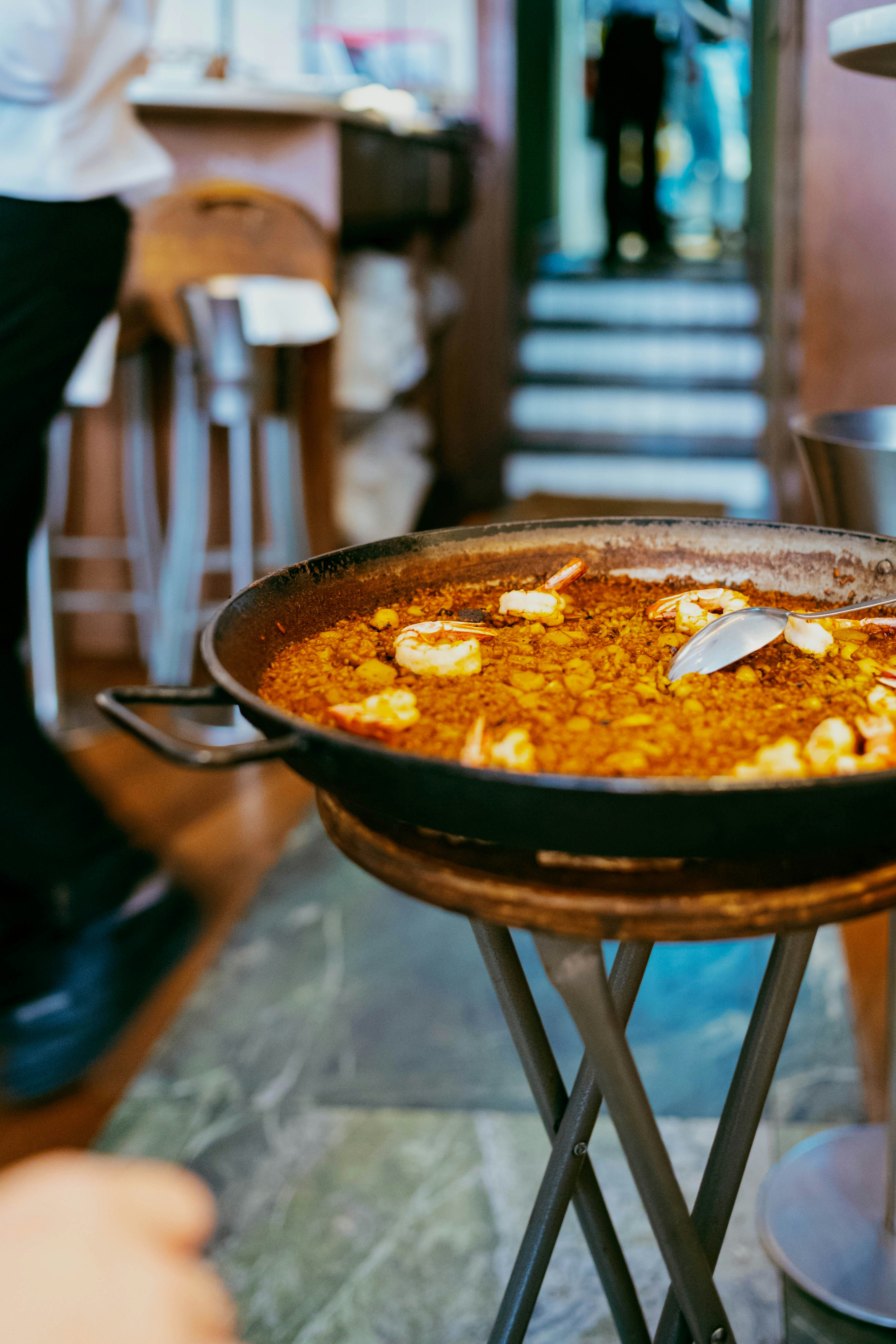 Sizzling Paella in a Cozy Café