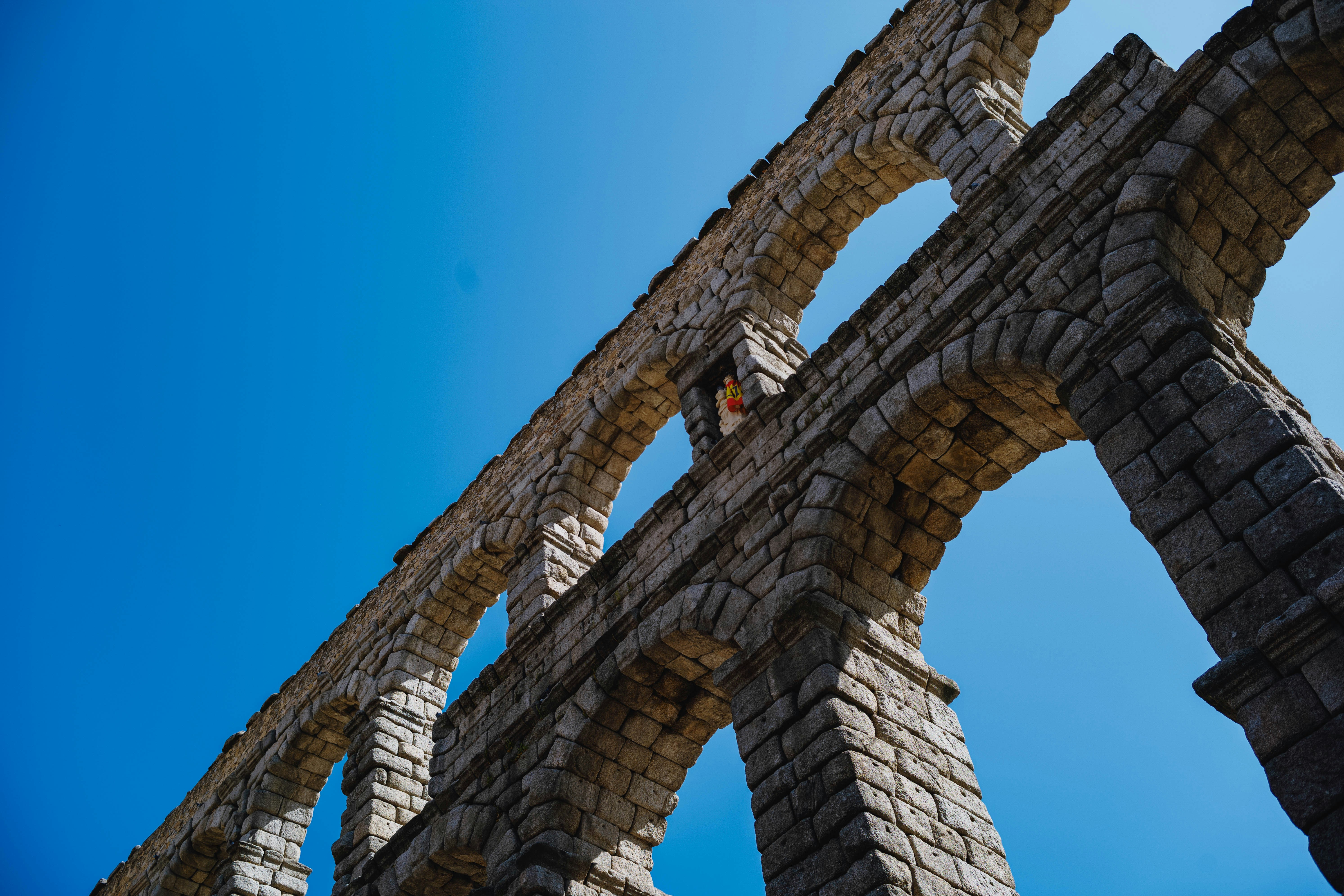 Stone Arches Reaching Toward a Clear Sky