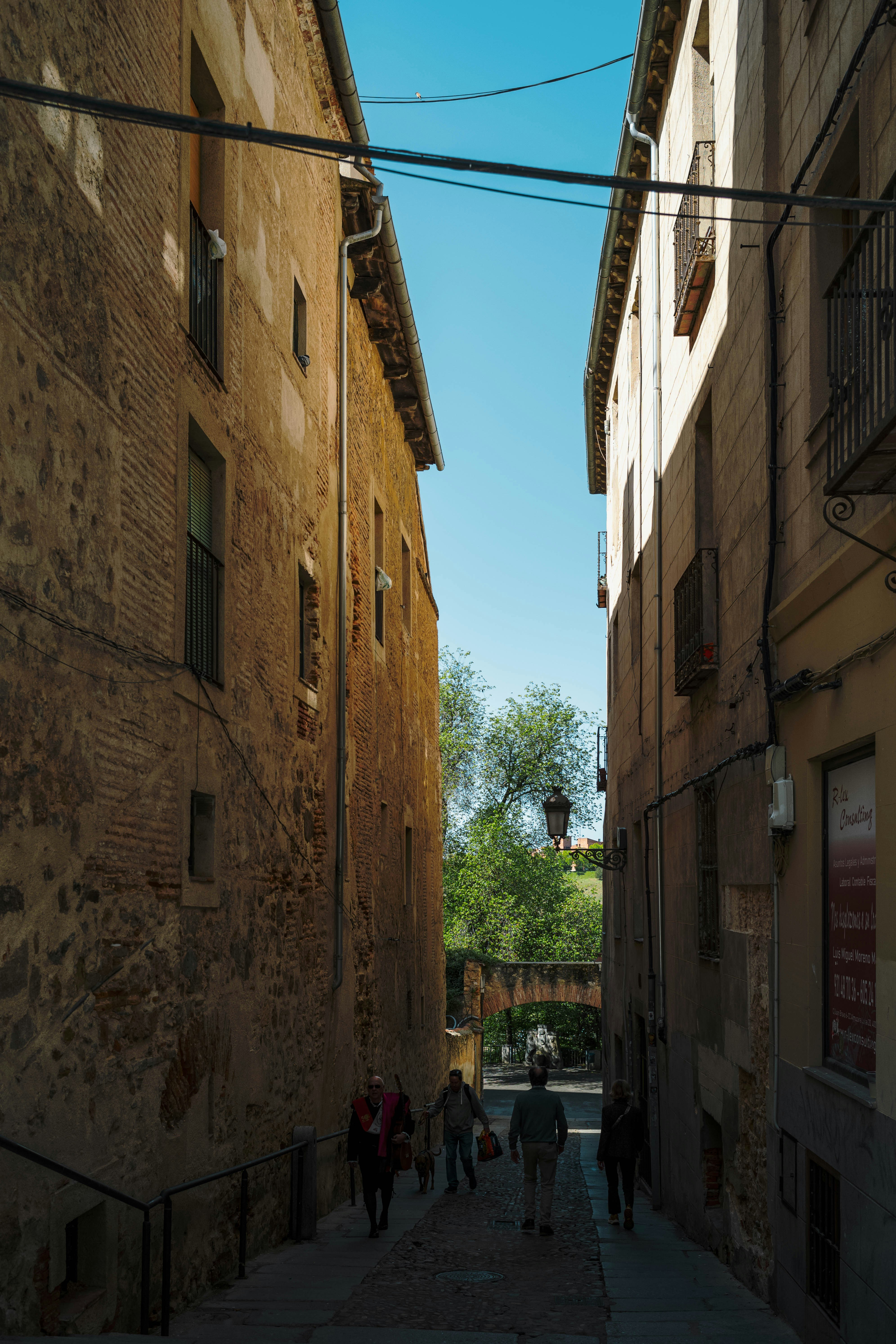 Sunlit Alleyway Through Time