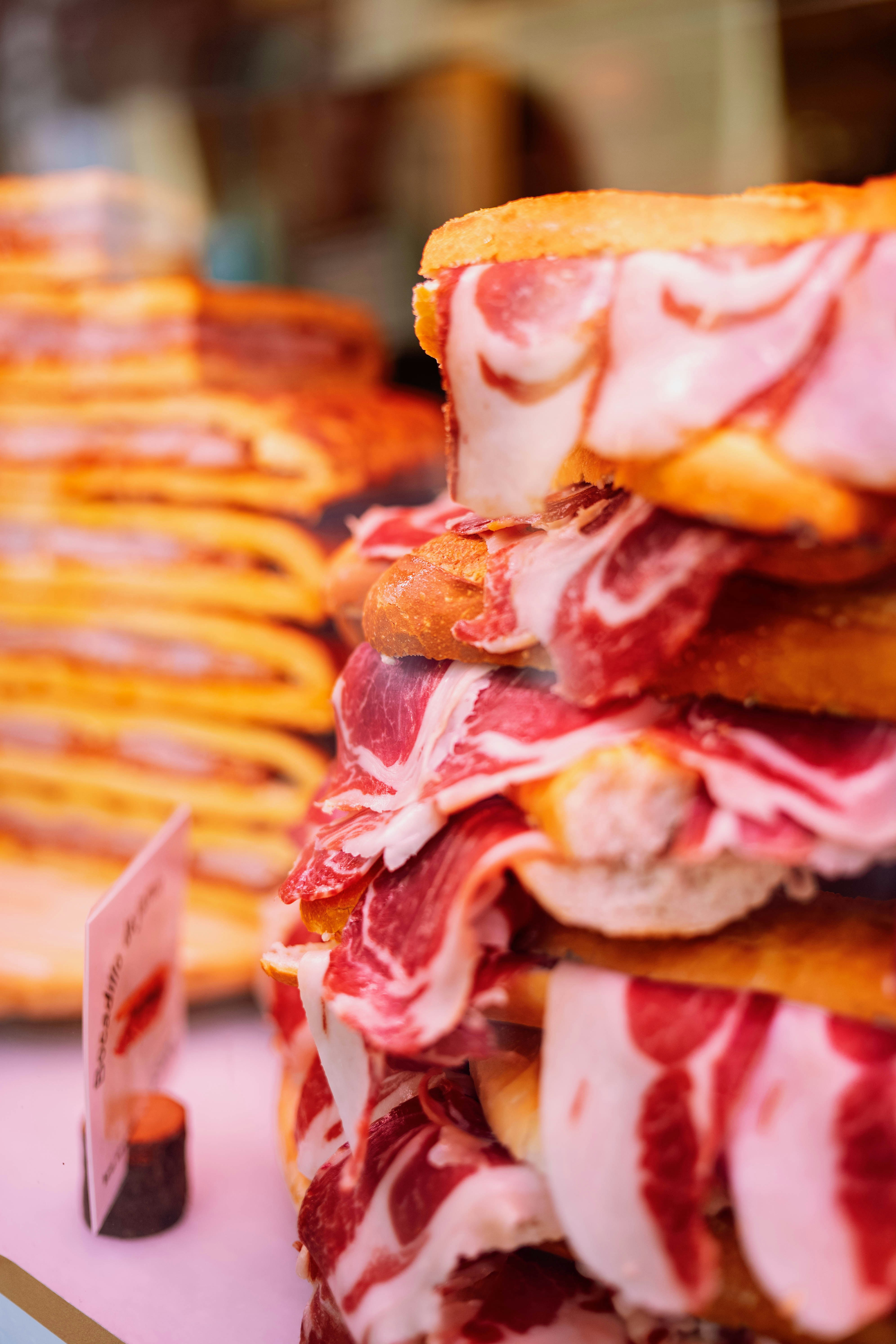 Stacked Charcuterie Awe: A Tower of Ribeye Slices and Prosciutto