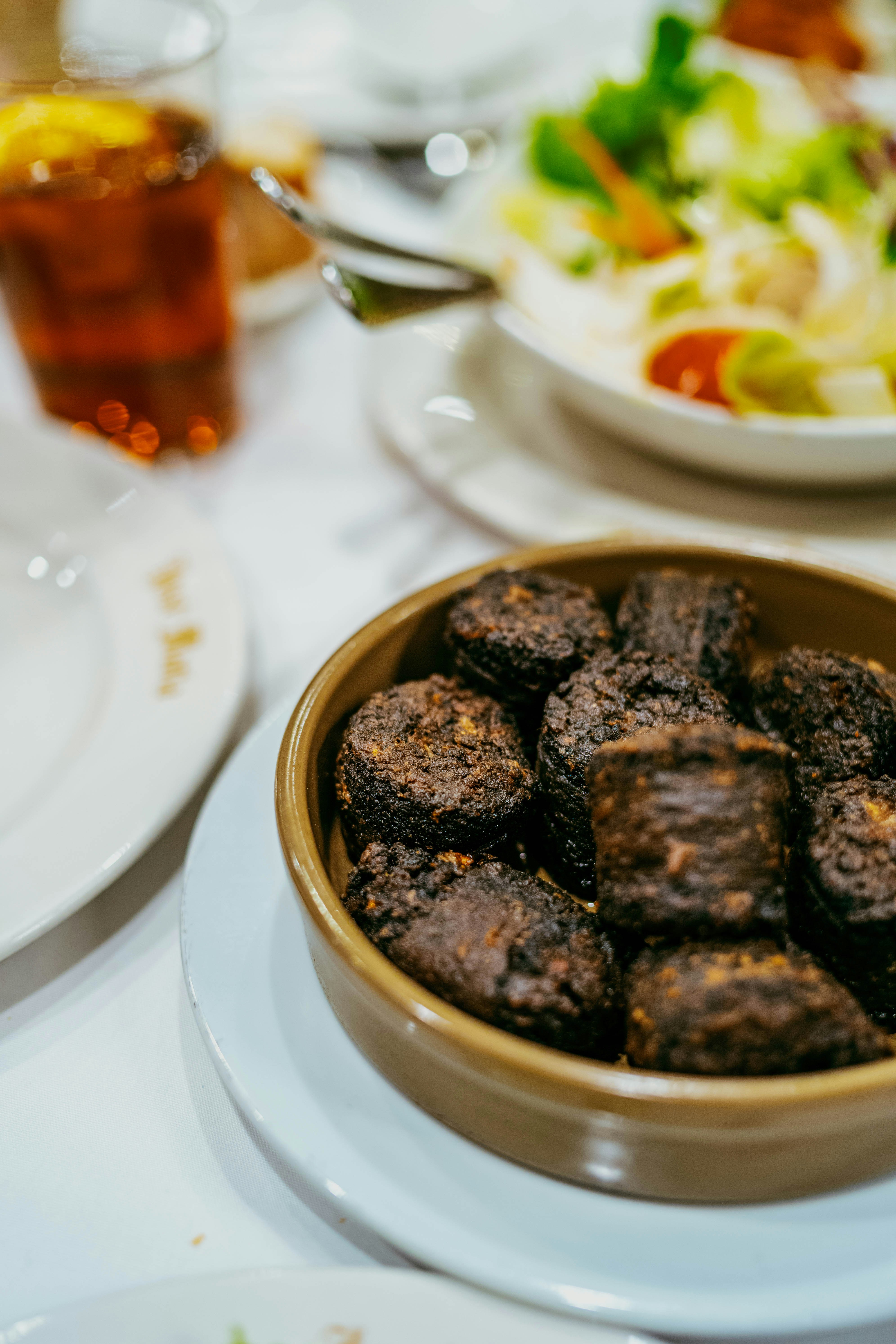 Charred Cubes in a Warm Bowl: Charisma of a Social Table
